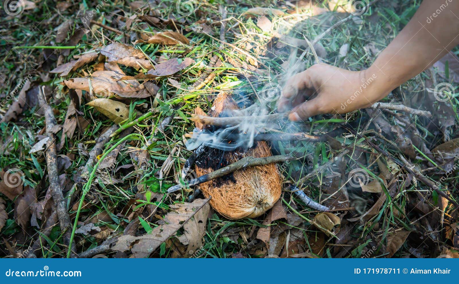 Making a Fire Using a Hot Coal from Dried Tree Branches and Coconut ...