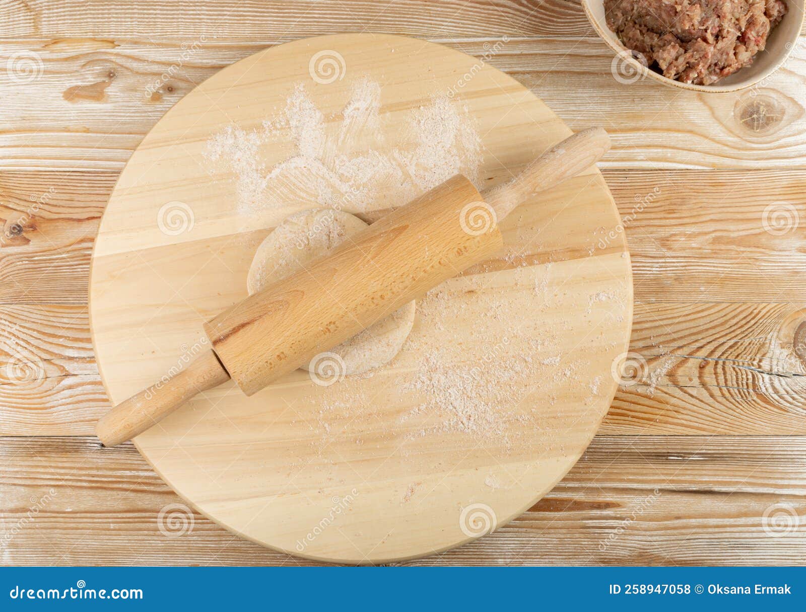 Making Flat Bread, Rolling Out the Dough on Wooden Table Stock Photo ...