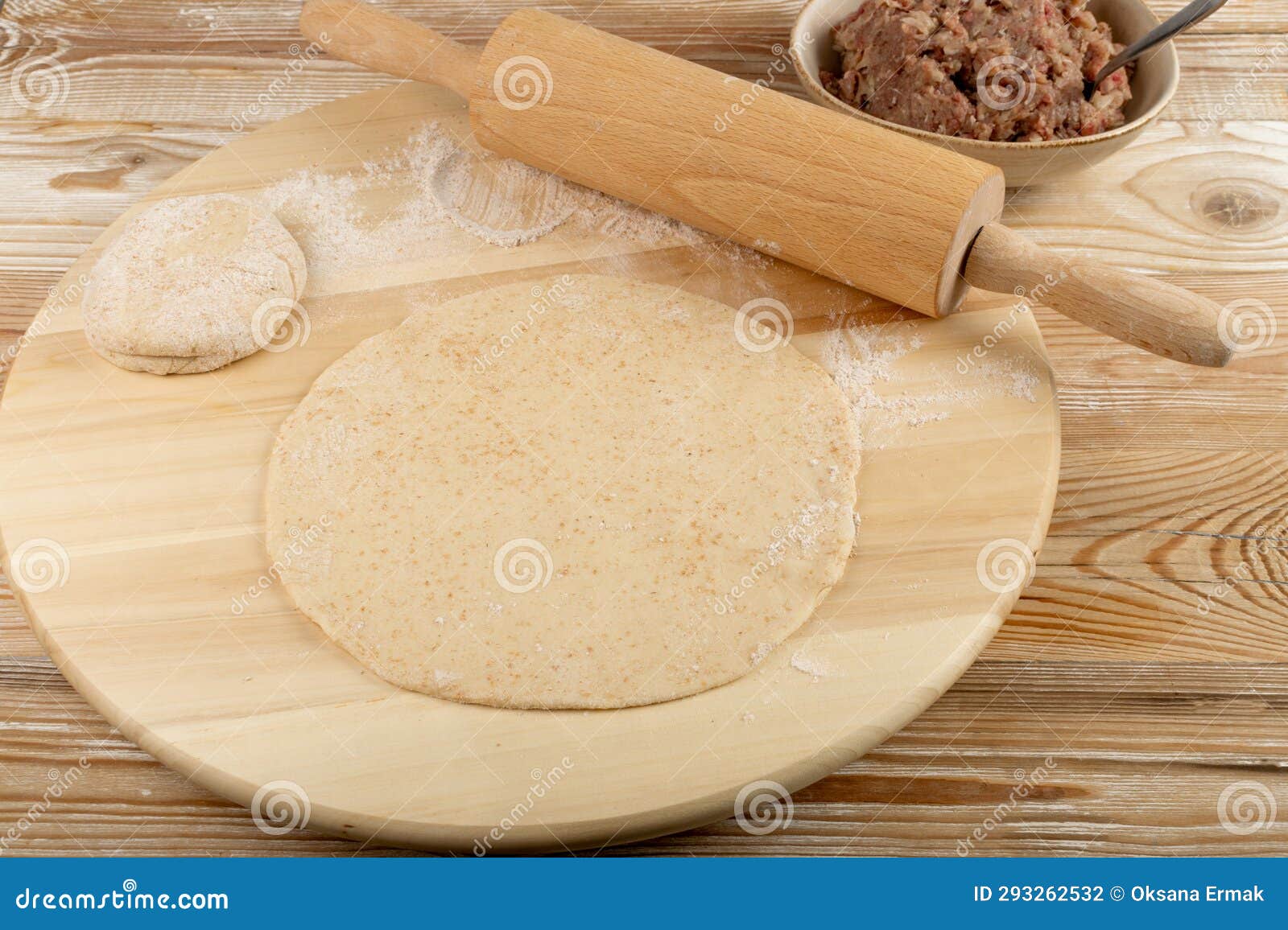 Making Flat Bread, Rolling Out the Dough on Wooden Table Stock Photo ...