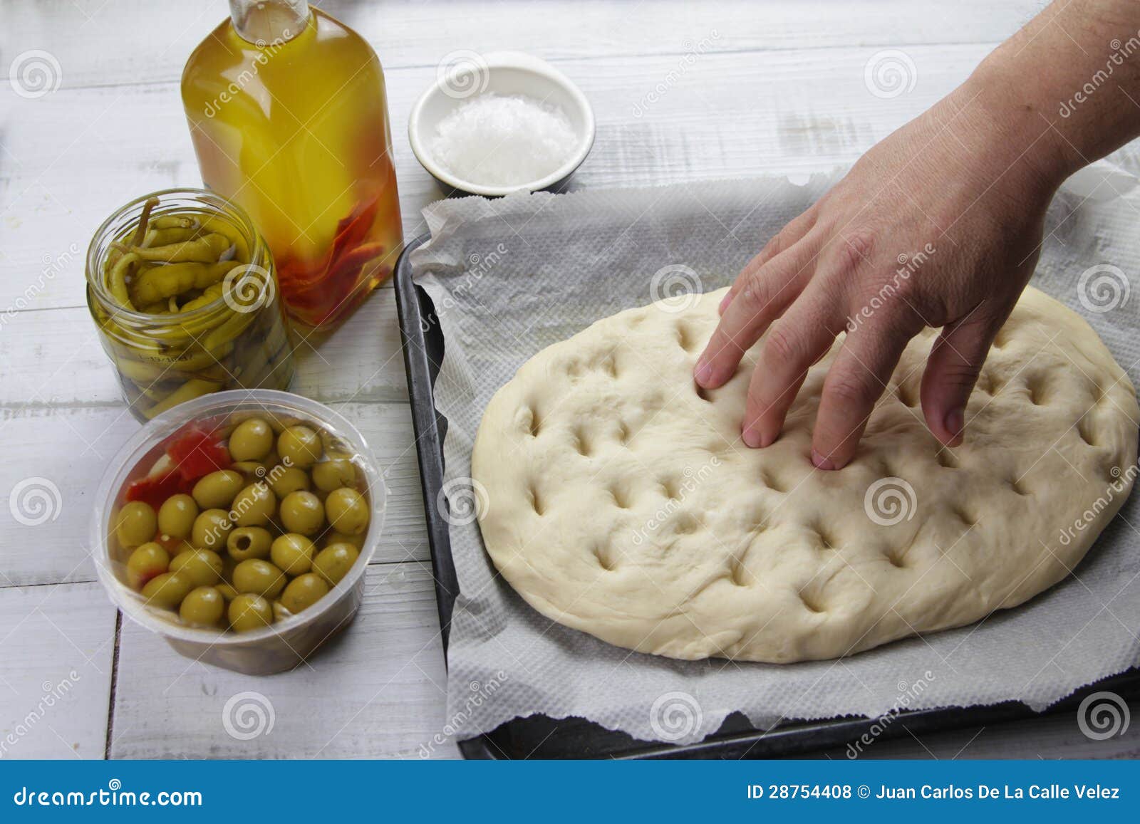 Making Focaccia Bread Dough Stock Photo - Image of deflating, olive ...