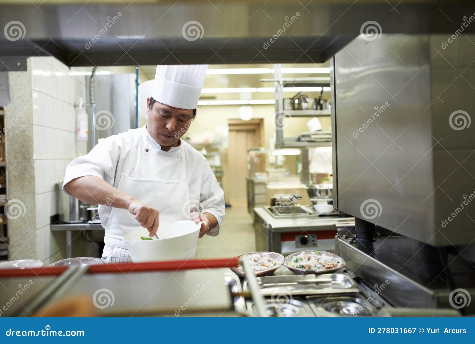 Making a Gastronomic Masterpiece. Chefs Preparing a Meal Service in a ...