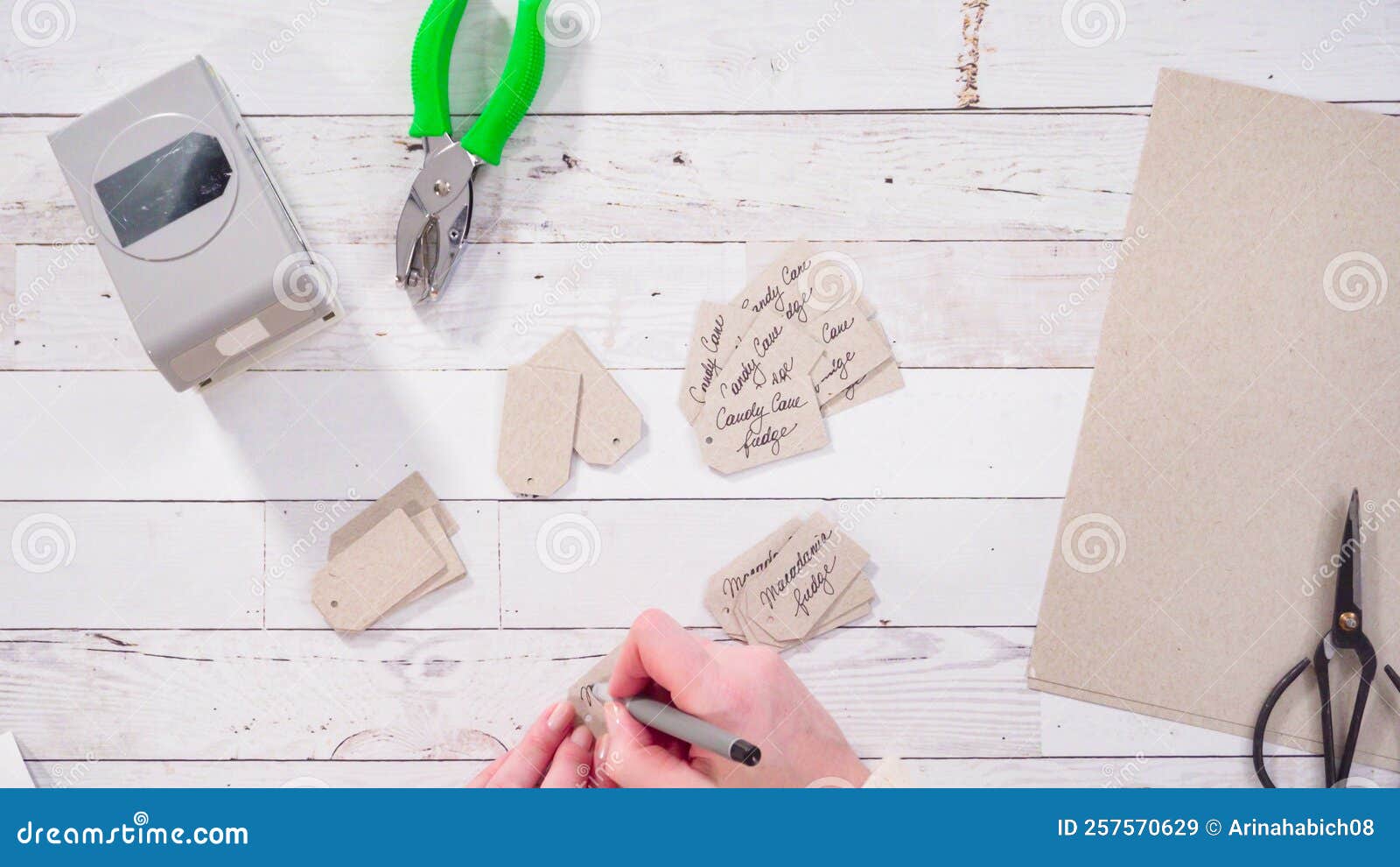 Making a gift tags stock image. Image of confectionary - 257570629