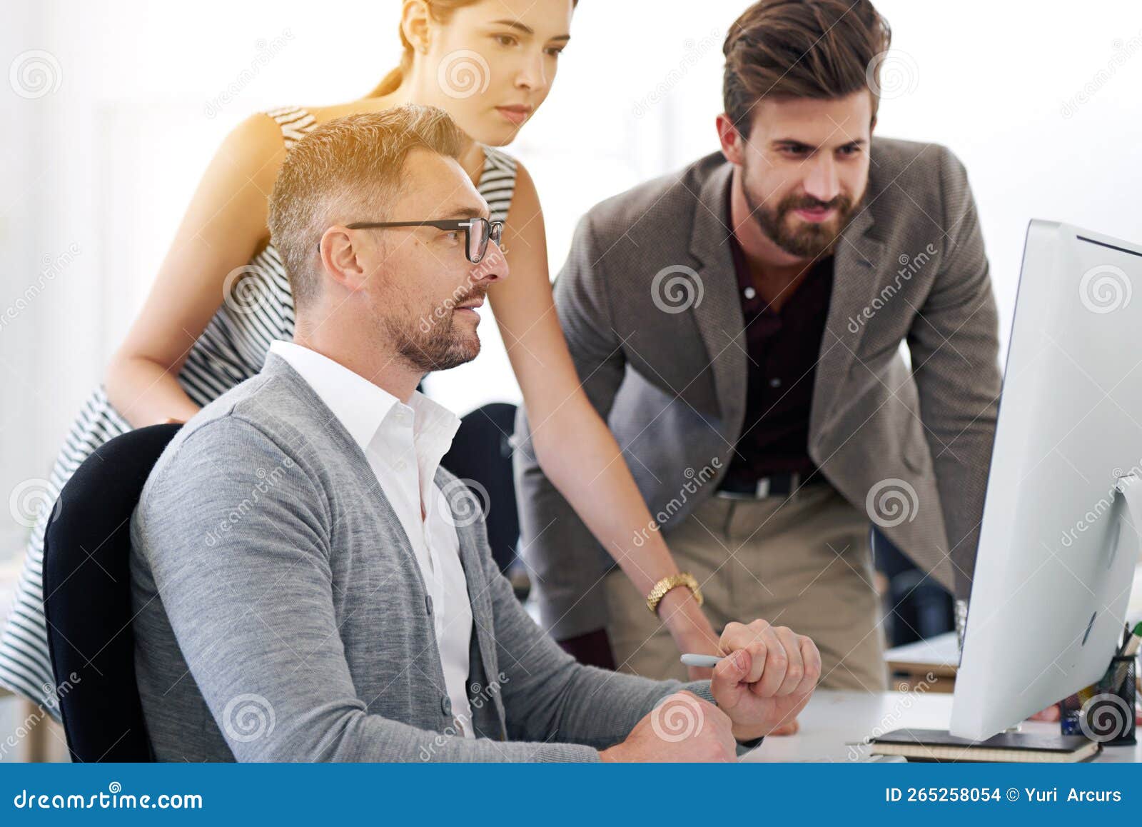 Making Great Progress on Their Project. a Group of Designers Working ...