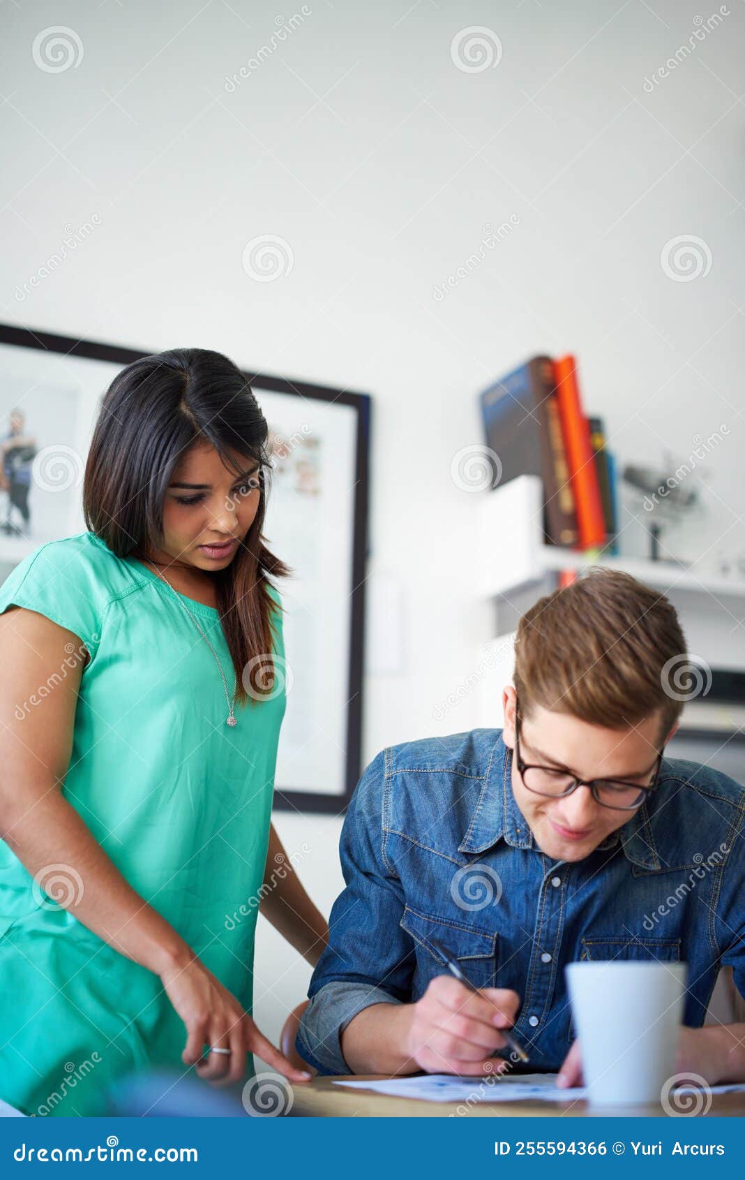 Making Great Progress on Their Project. Two Colleagues Working Together ...