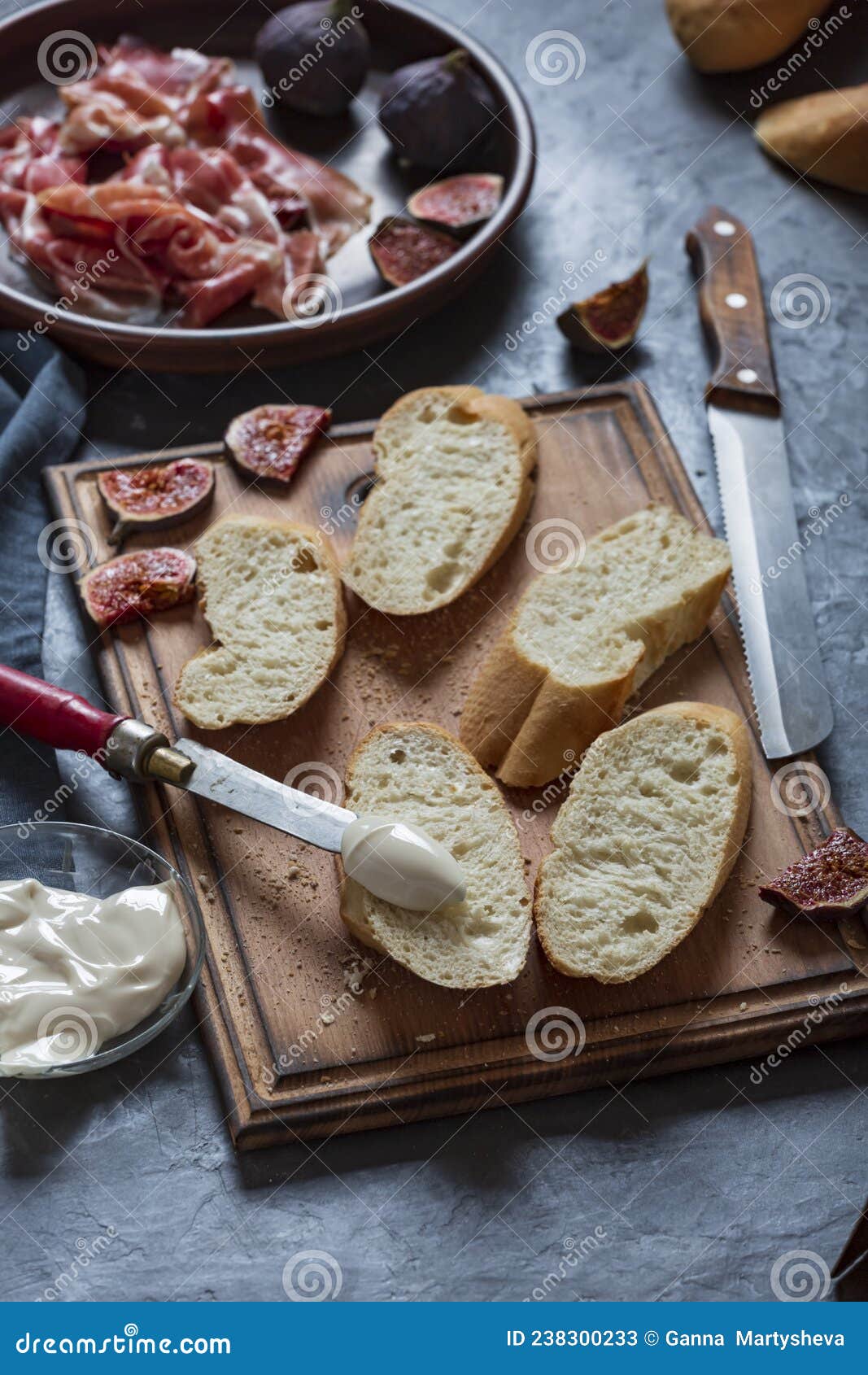 Making ham sandwiches stock image. Image of closeup - 238300233