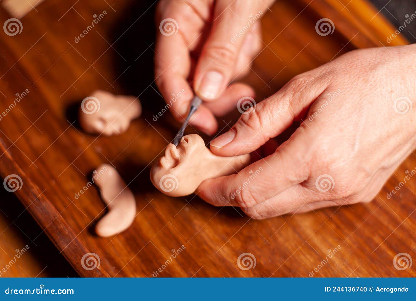 Making a Head Sculpture with Modeling Clay Stock Photo - Image of ...