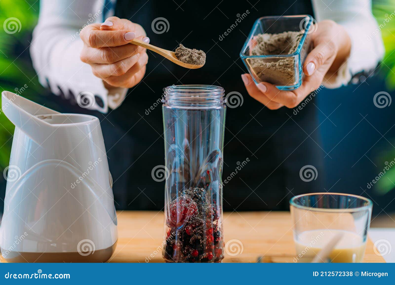 Making Healthy Shake with Berries and Plant Protein Powder Stock Photo ...
