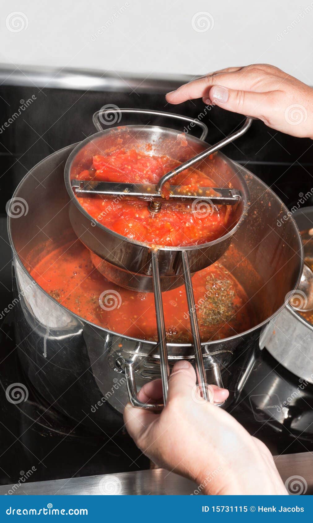 Making Homemade Tomato Sauce Stock Image - Image of sauce, hand: 15731115