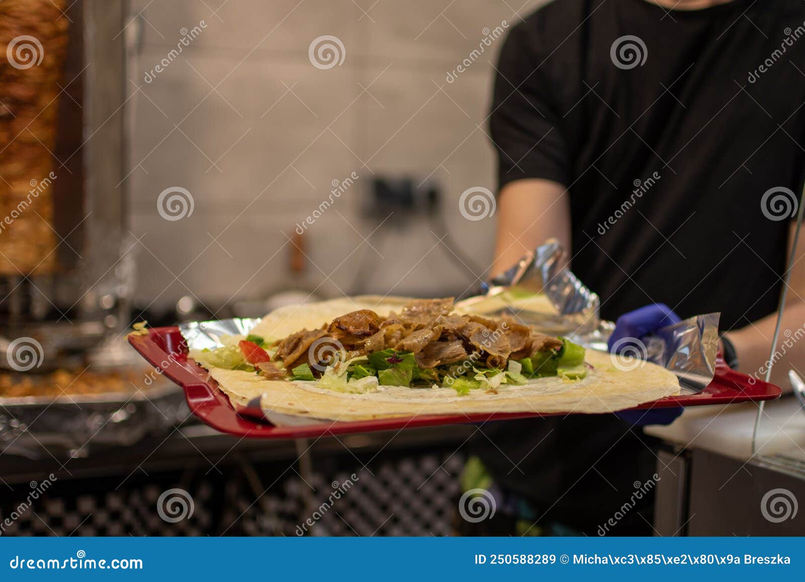 Making a Kebab in a Restaurant Chicken Salad in Rollo Stock Image ...