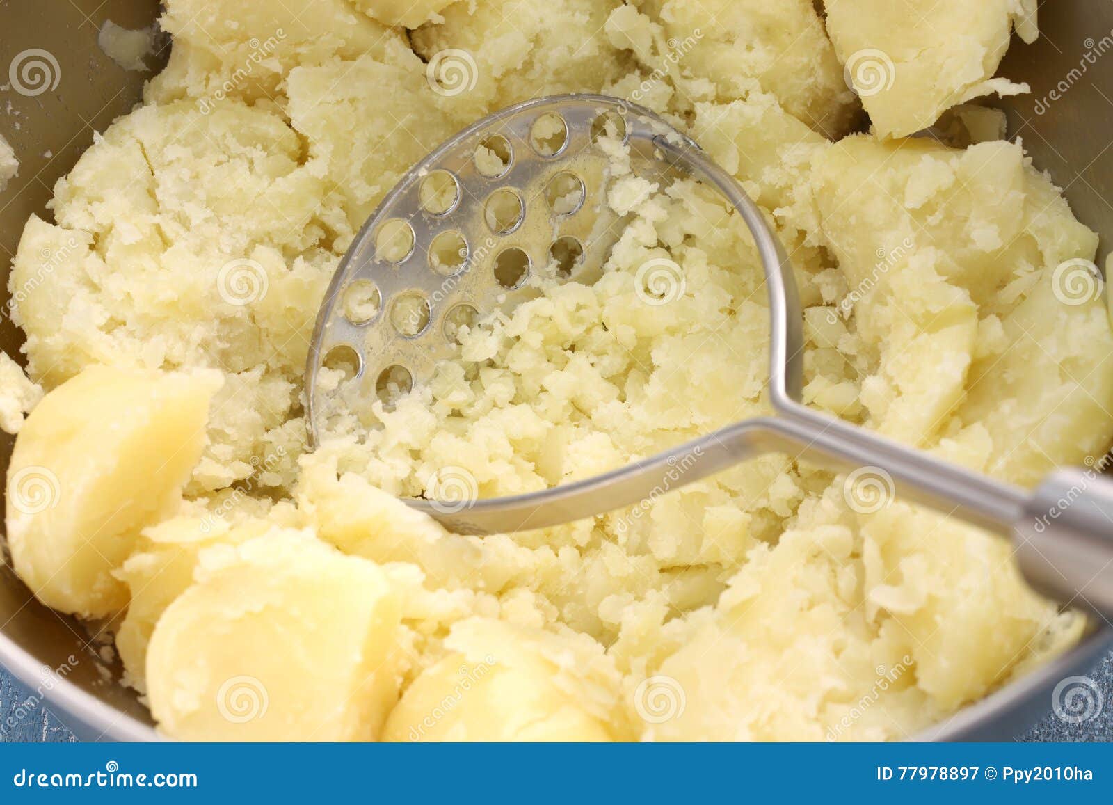 Making mashed potatoes stock image. Image of utensil - 77978897