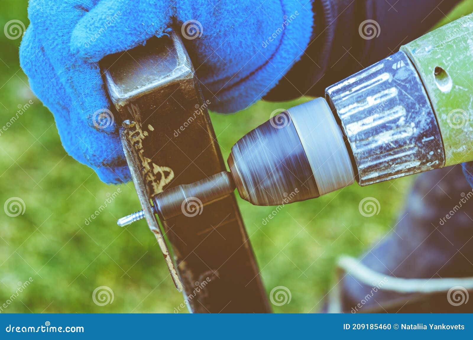 Making Metal Products. Dealing with a Power Tool. the Man& X27;s Hands ...