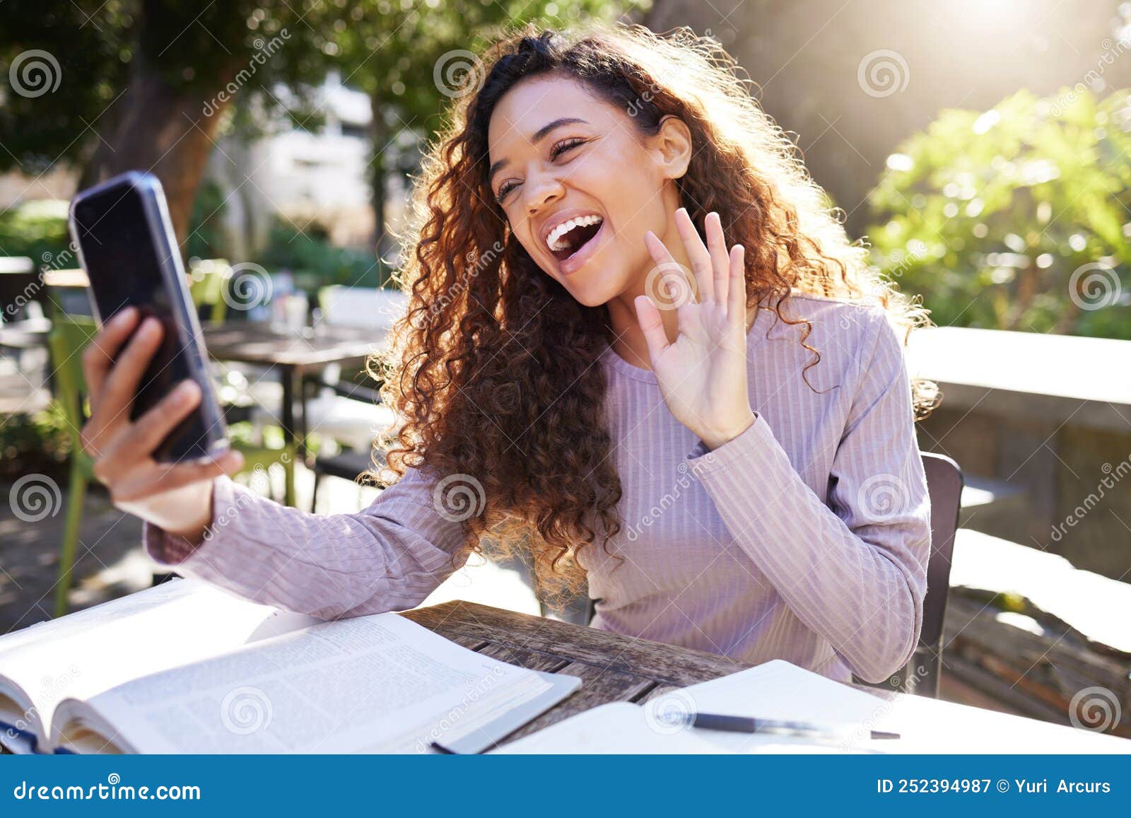 Making the Most of My Study Breaks. a Young Female Student Using a ...