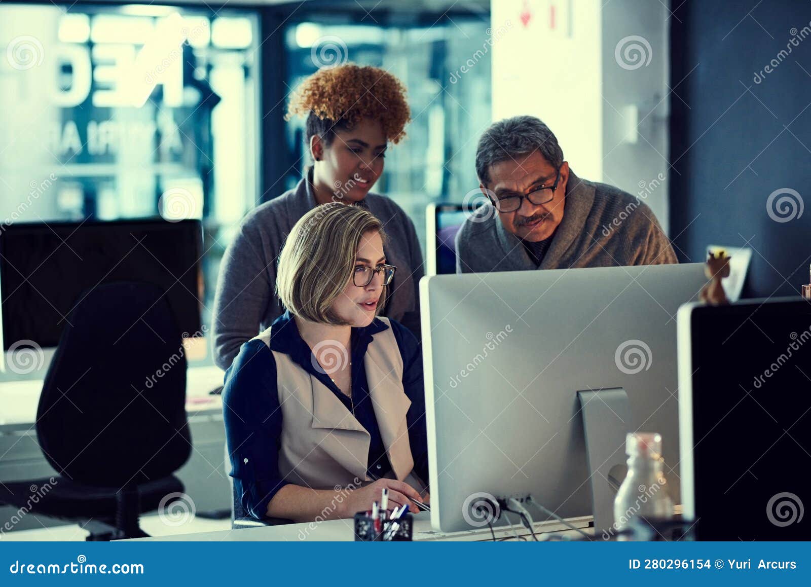 Making it a Night of Hard Work. a Group of Businesspeople Working Late ...