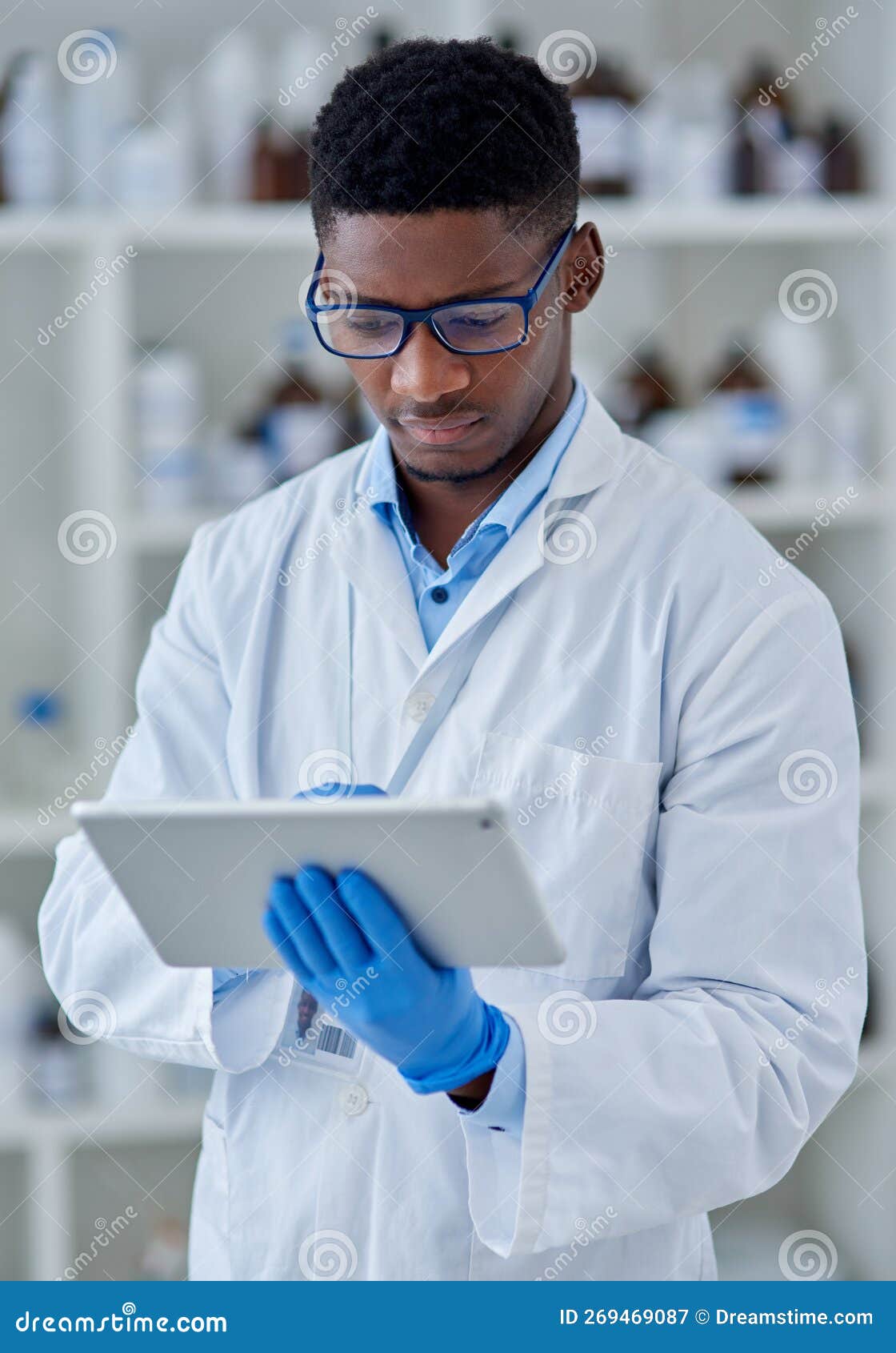Making Notes the Digital Way. a Focused Young Male Scientist Working on ...