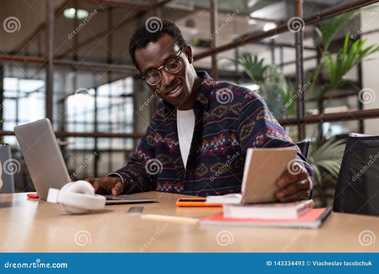 Man Taking Notes while Working with a Computer Stock Image - Image of ...