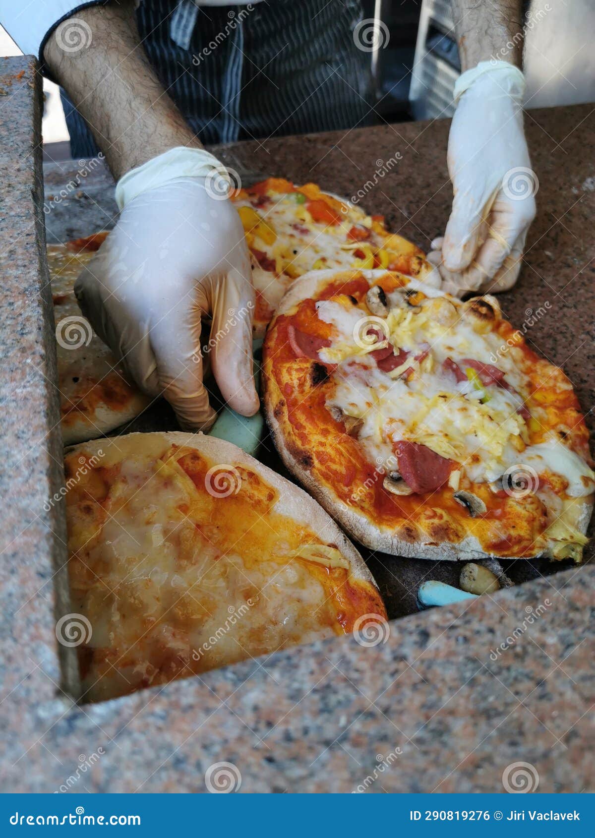 Making pizza as fast work stock photo. Image of table - 290819276
