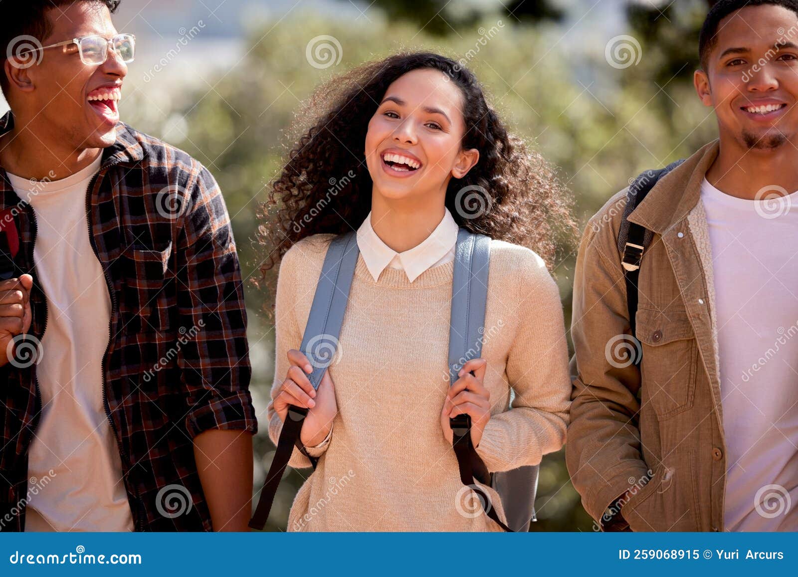 Making Plans. a Group of Students Walking through Campus Together ...