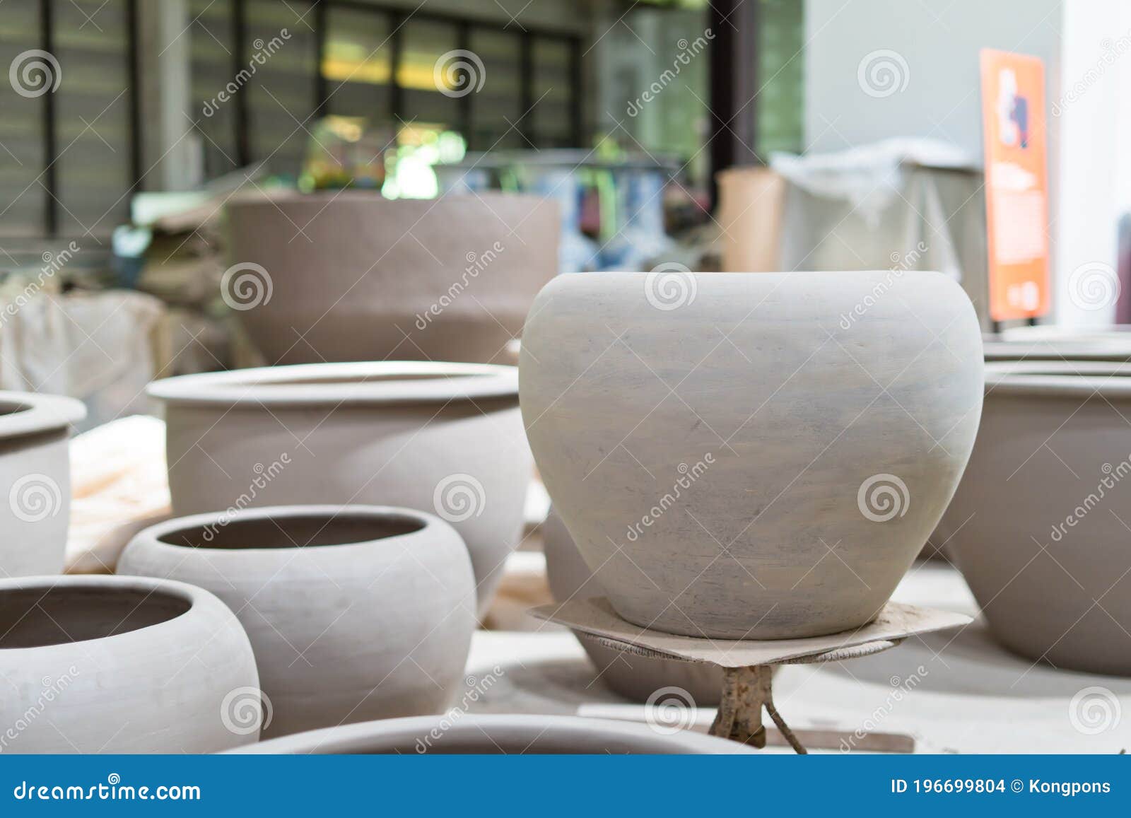 Making Pottery in a Factory Stock Photo - Image of shaping, hand: 196699804