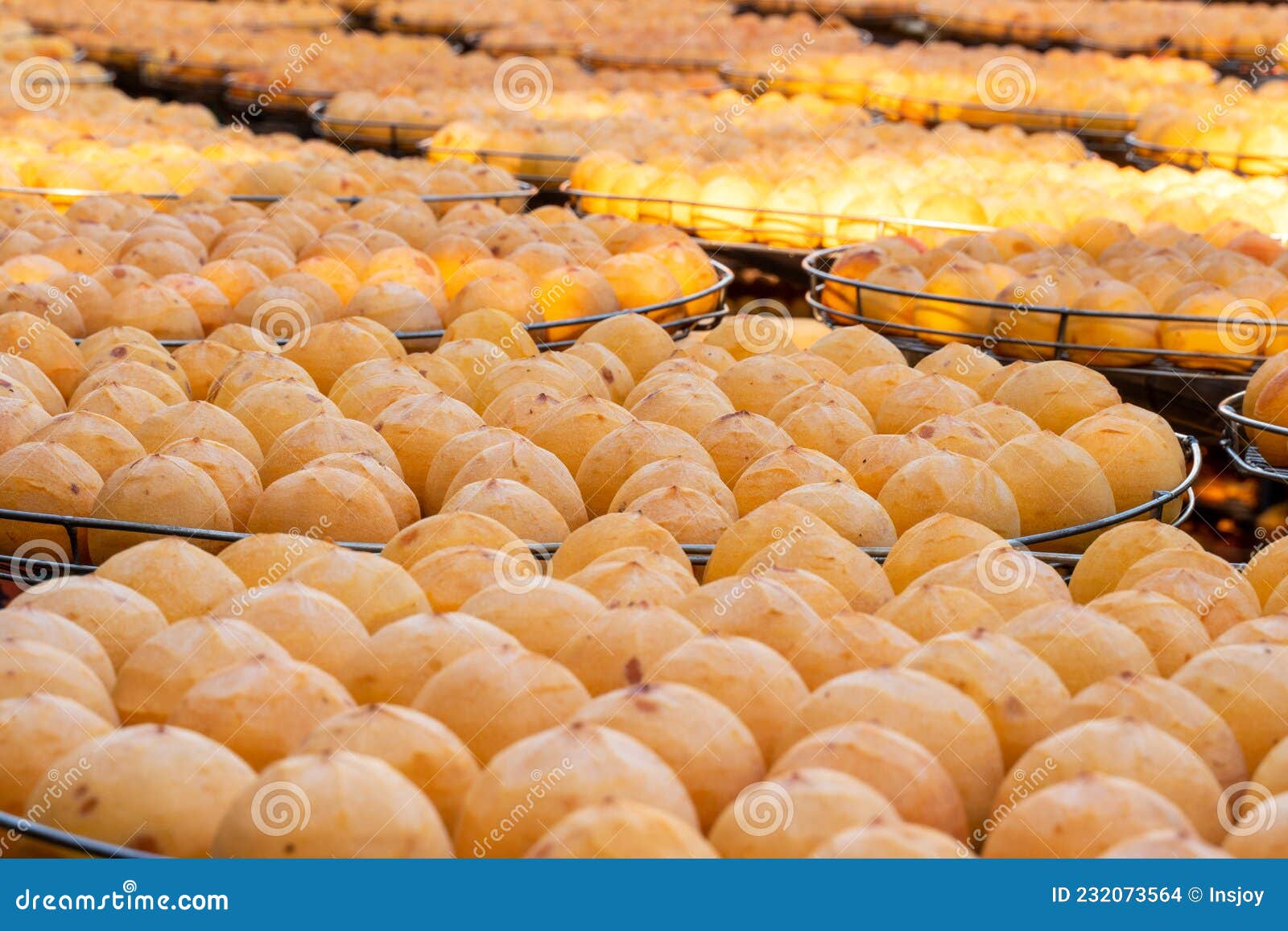 Making Process of Sun Exposuring Dried Persimmon in a Sieve in Autumn ...