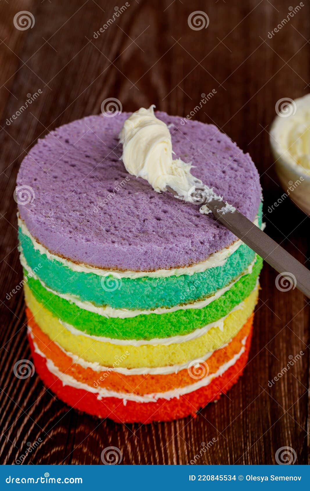 Making Rainbow Layer Cake with White Cream Stock Photo - Image of ...