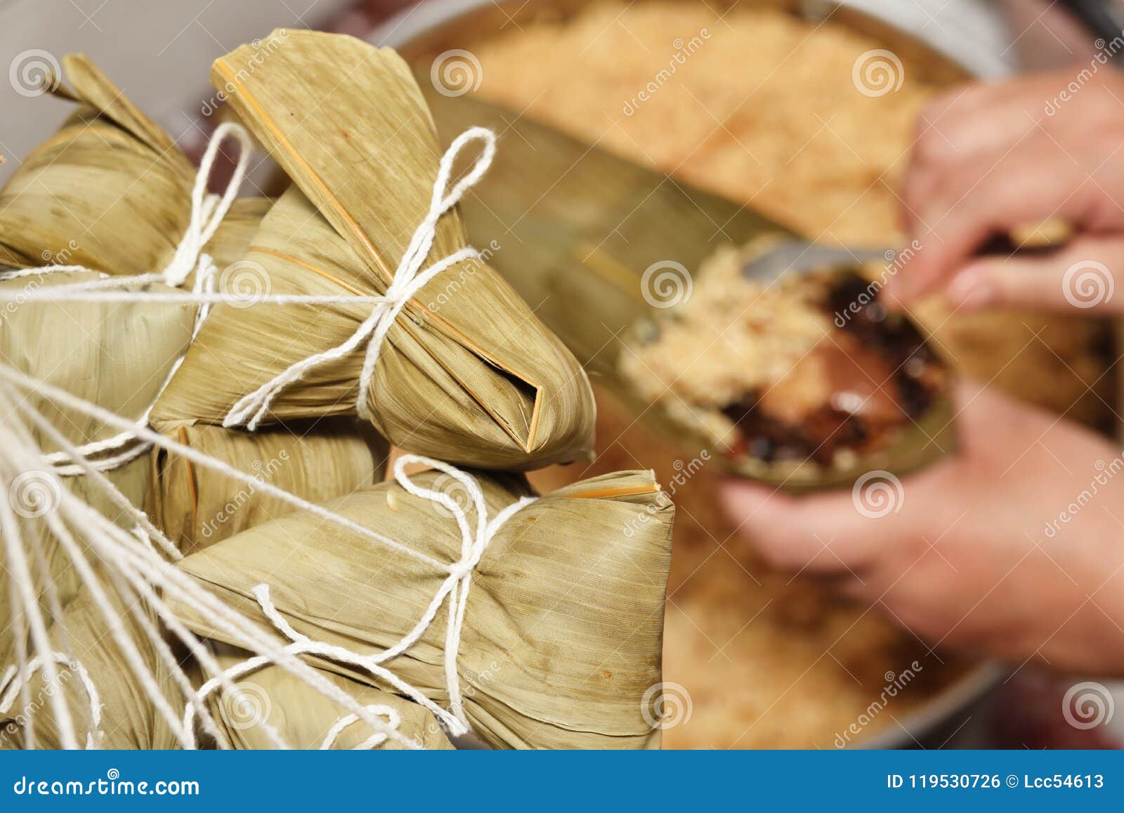 Making rice dumpling stock photo. Image of glutinous - 119530726