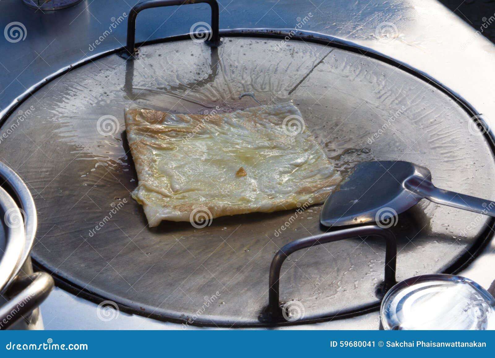 Making of roti on the pan stock image. Image of chapatti - 59680041
