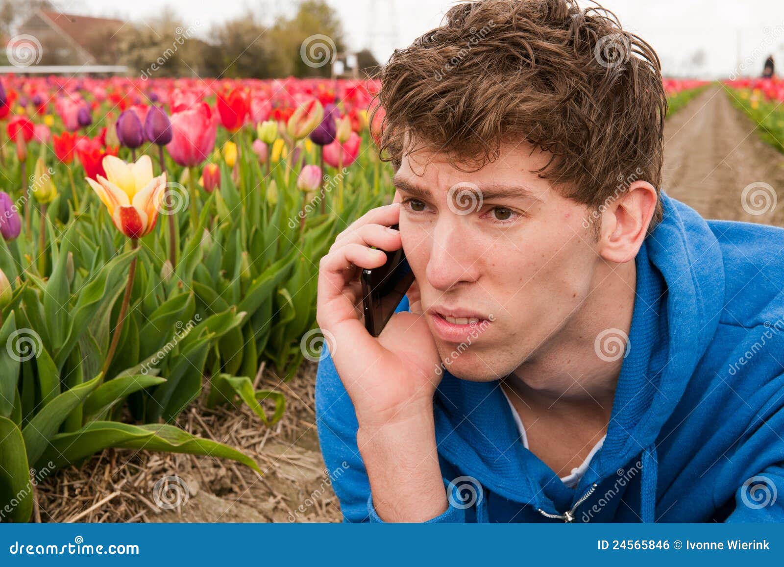 Making a sad phone call stock photo. Image of laying - 24565846