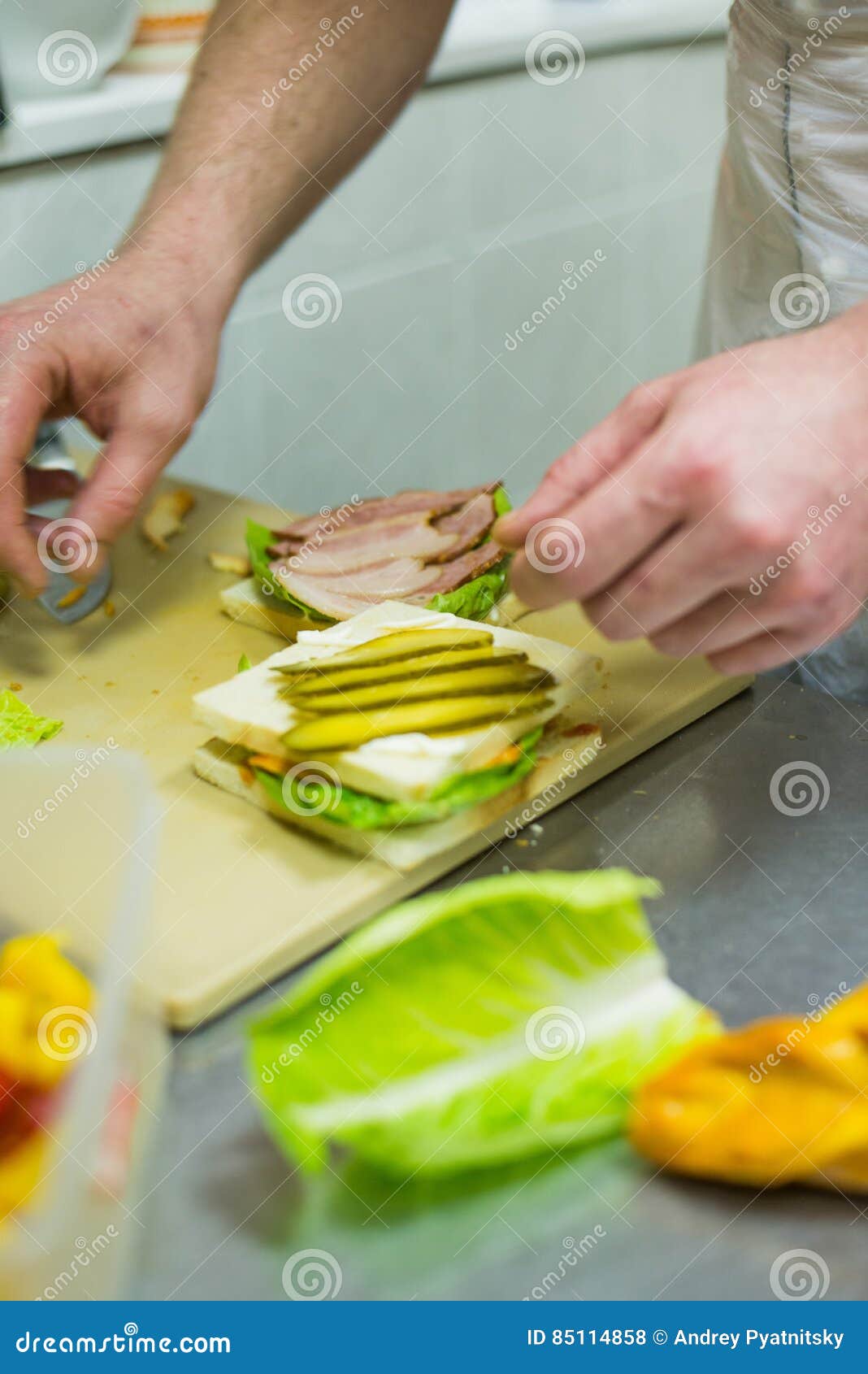 Making a sandwich stock photo. Image of lettuce, hand - 85114858
