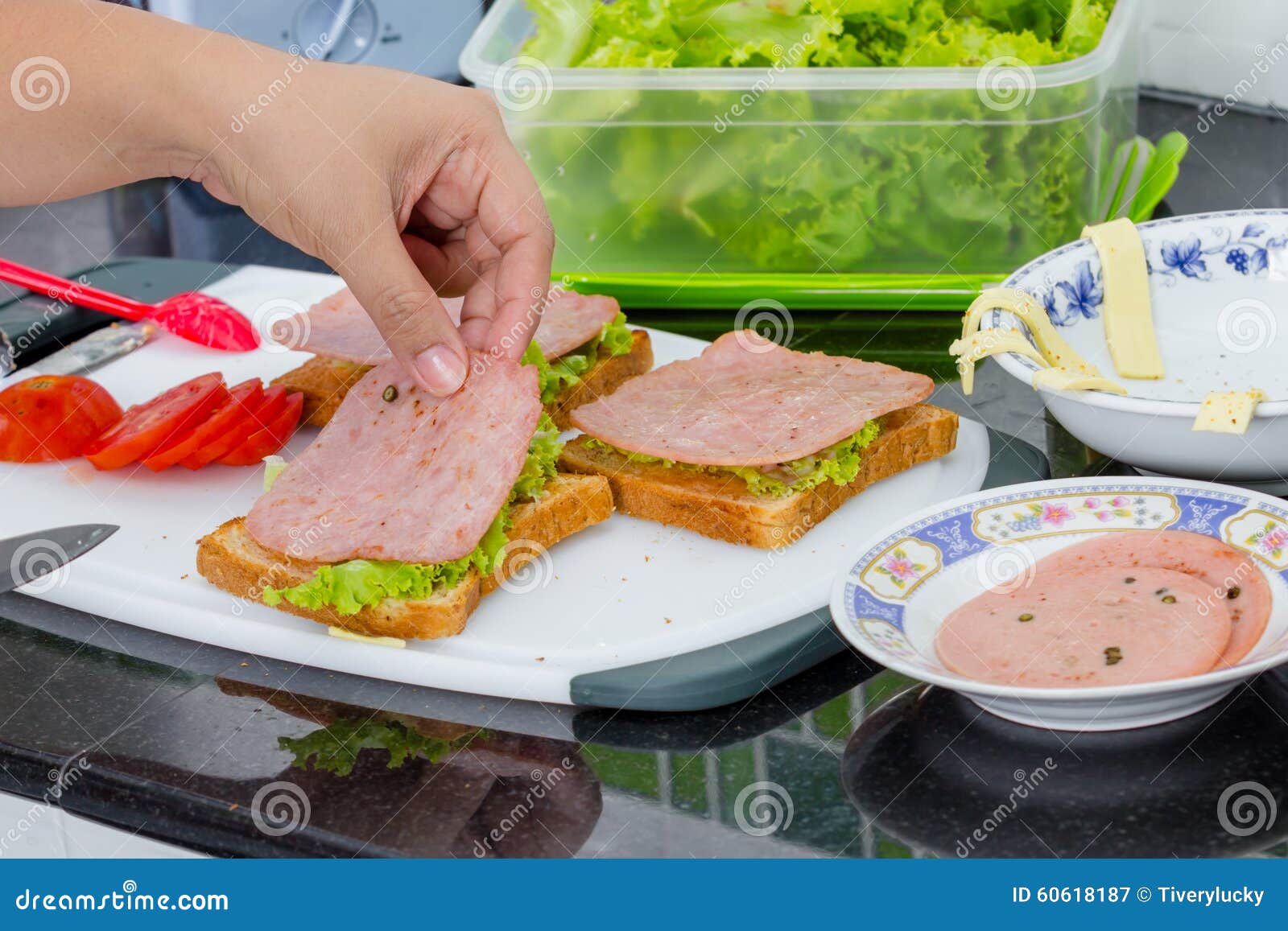 Making a sandwich stock image. Image of lunch, meat, tomato - 60618187