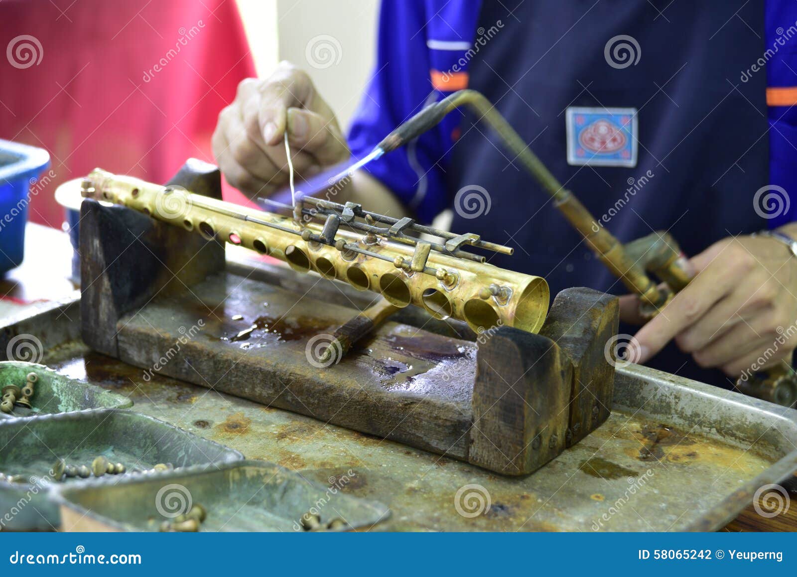 Making saxophone. stock photo. Image of component, making - 58065242