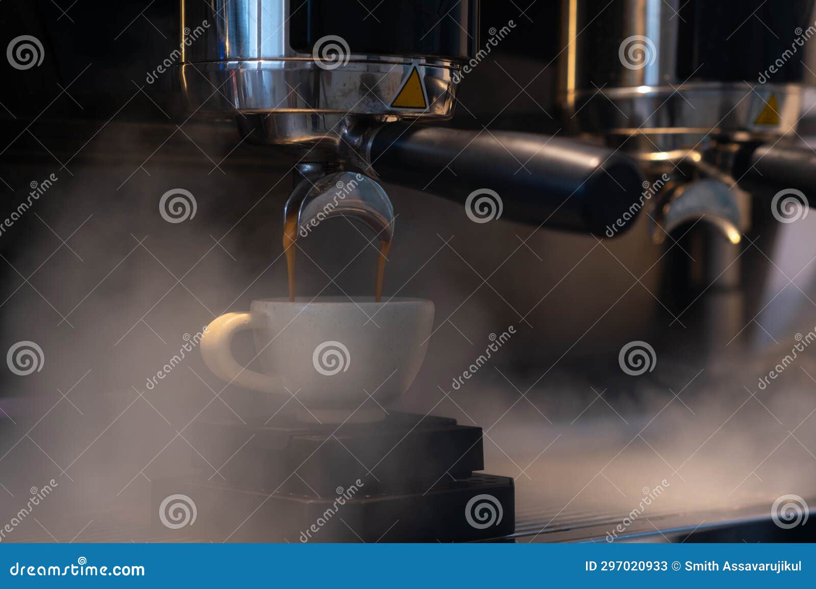 A Shot of Espresso from Espresso Coffee Machine with Steam from the ...