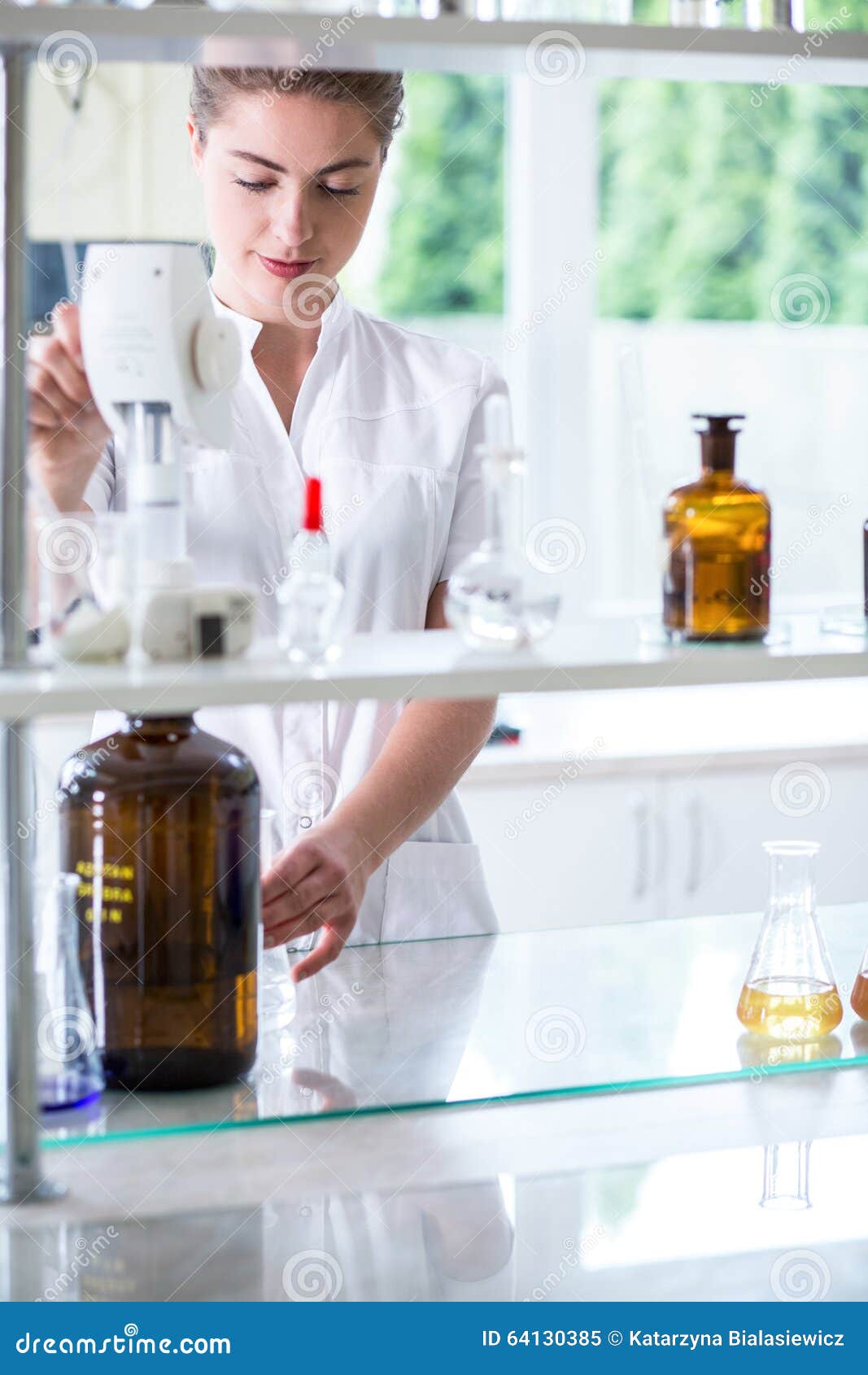 Making a solution stock image. Image of bottle, professional - 64130385