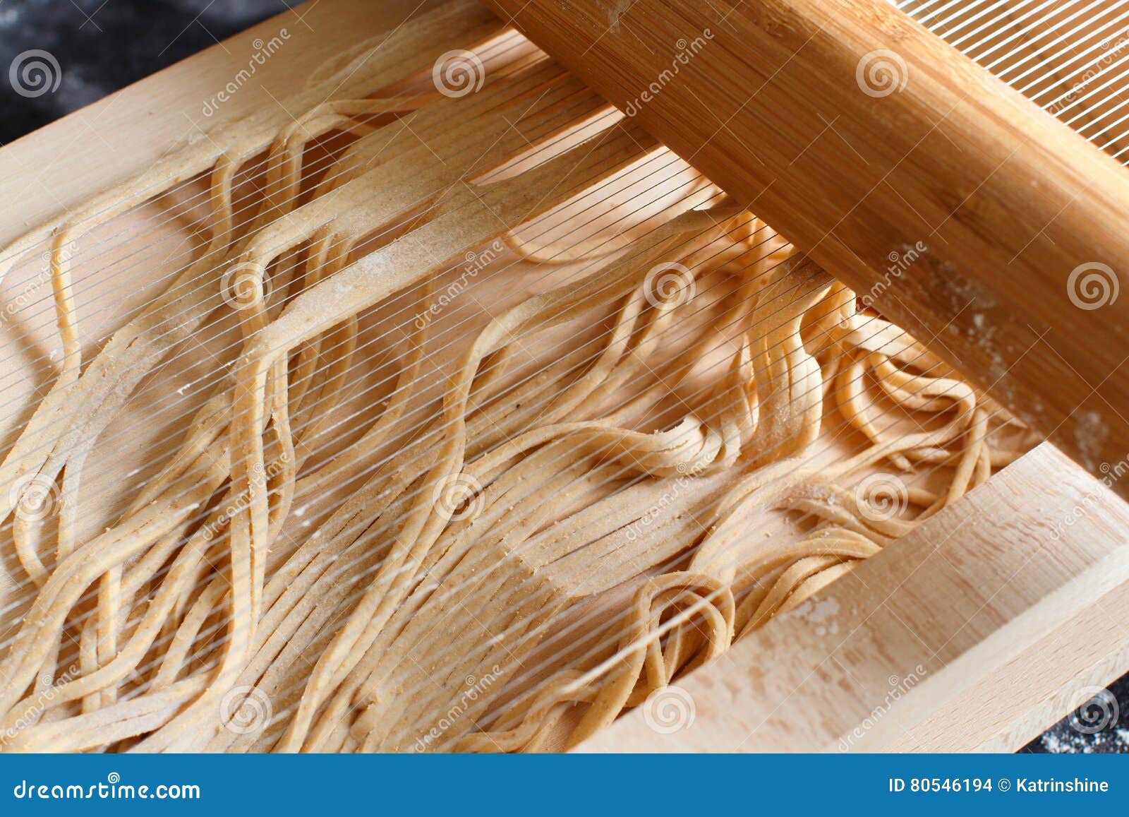 Making Spaghetti Alla Chitarra with a Tool Stock Photo - Image of dark ...