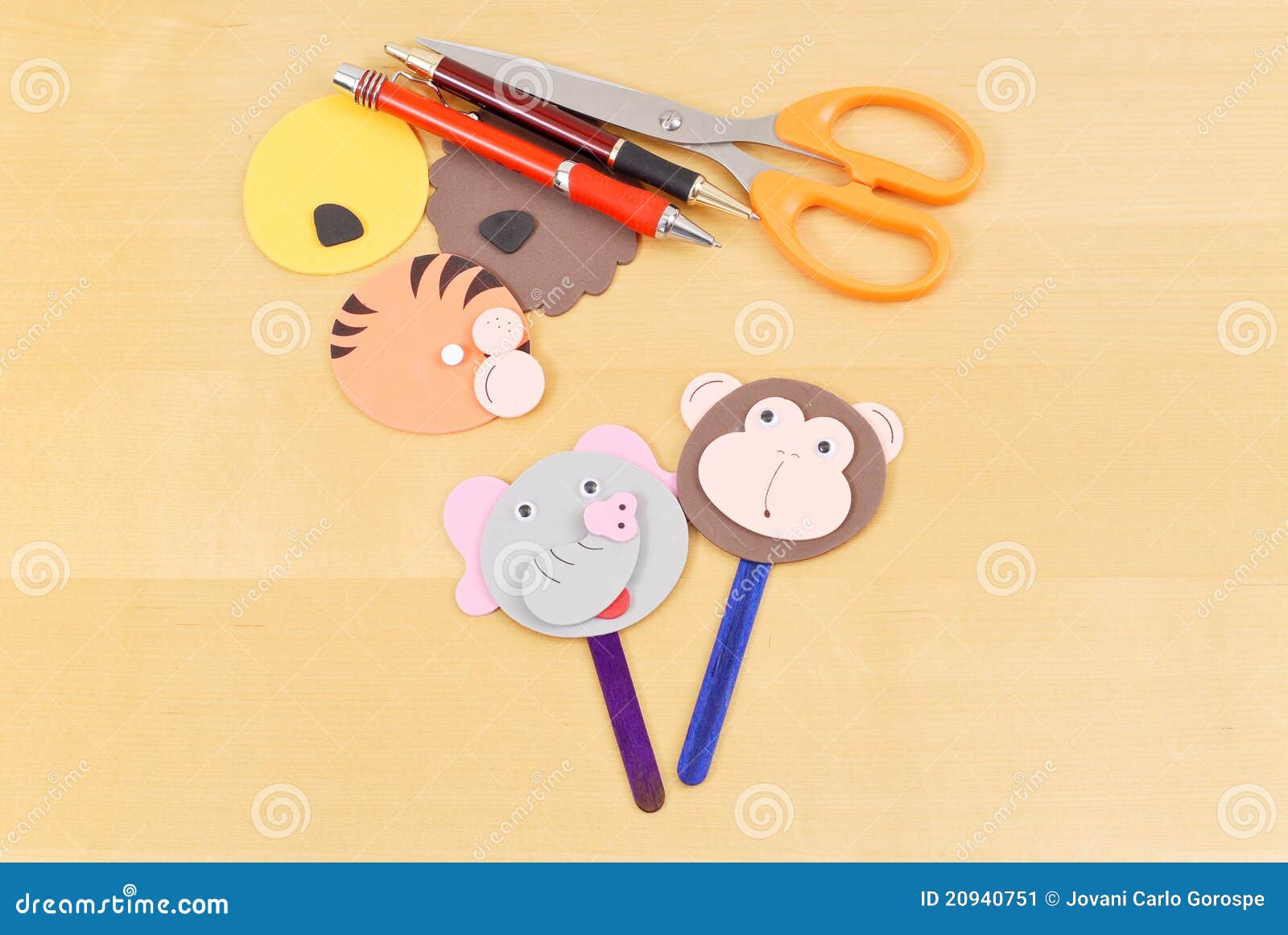 Making Stick Puppets stock image. Image of cloth, faces - 20940751