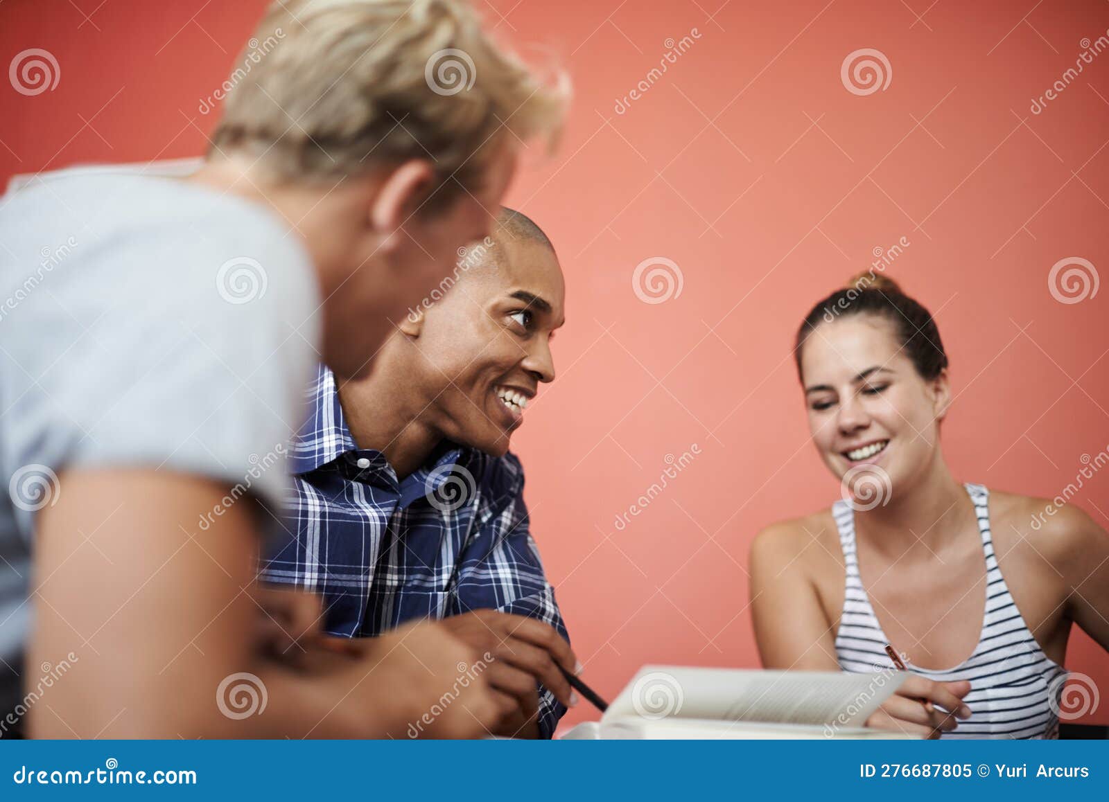 Making Study Easier. a Group of University Students Studying Together ...
