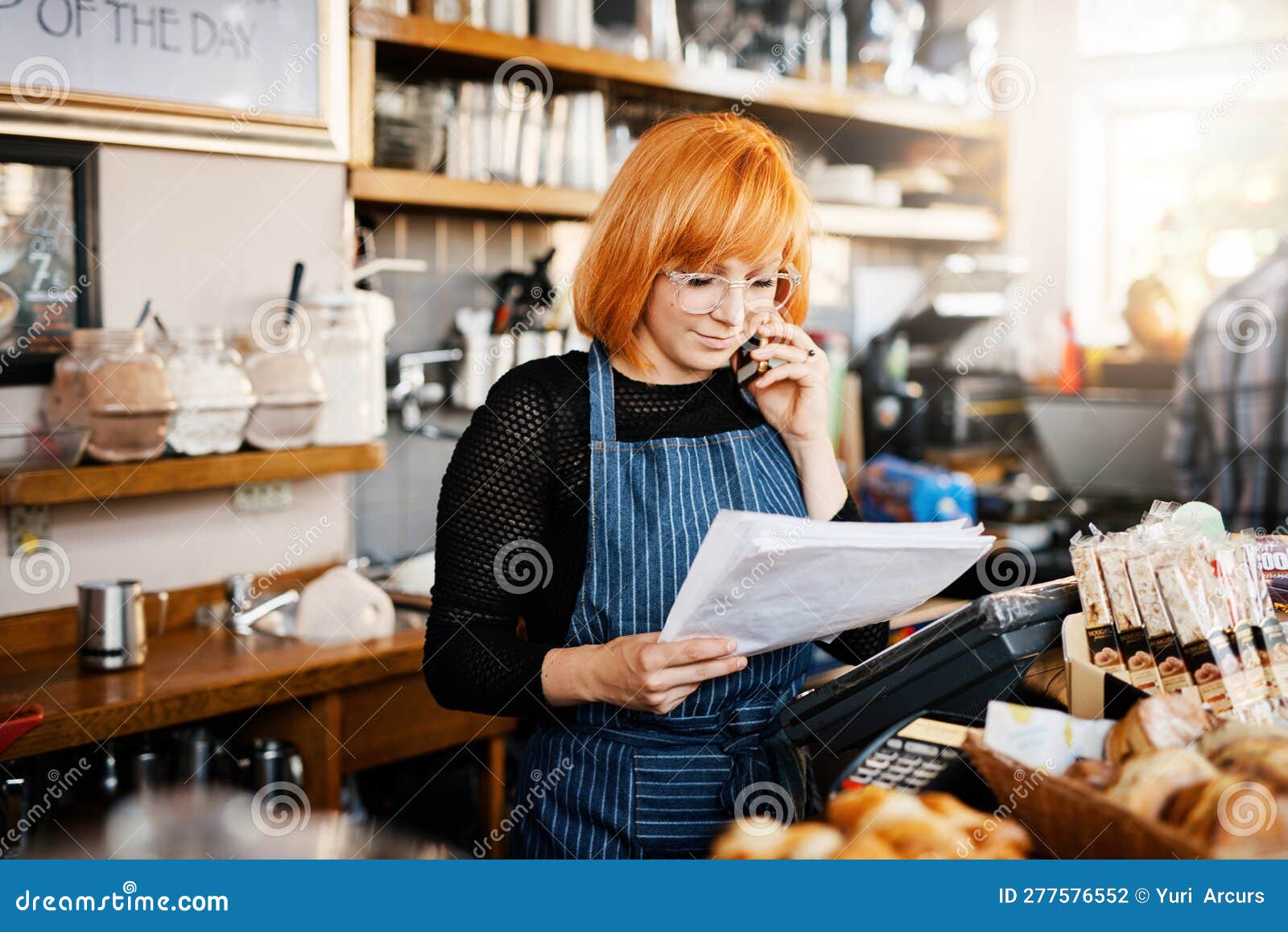 Making Sure that Her Order Will Arrive on Time. a Shop Owner Talking on ...