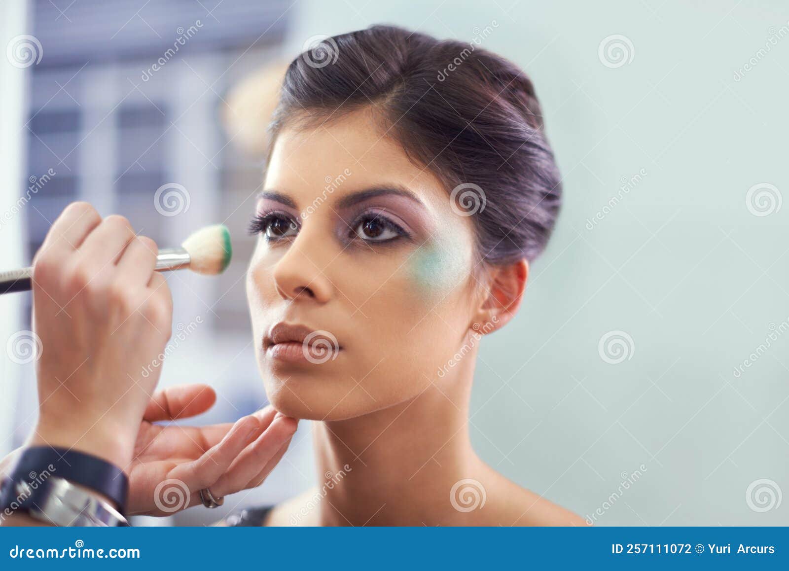 Making Sure Shes Camera-ready. a Young Woman Having Makeup Applied ...