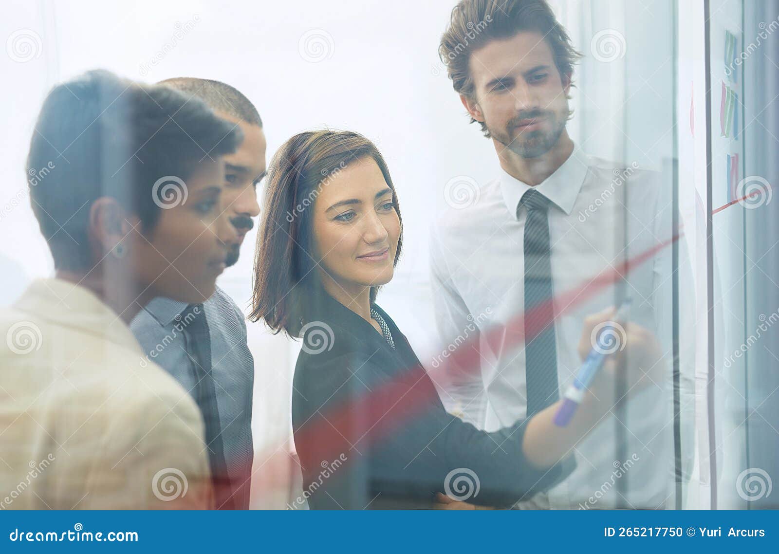 Making Their Ideas Visual. Colleagues Brainstorming in the Office ...