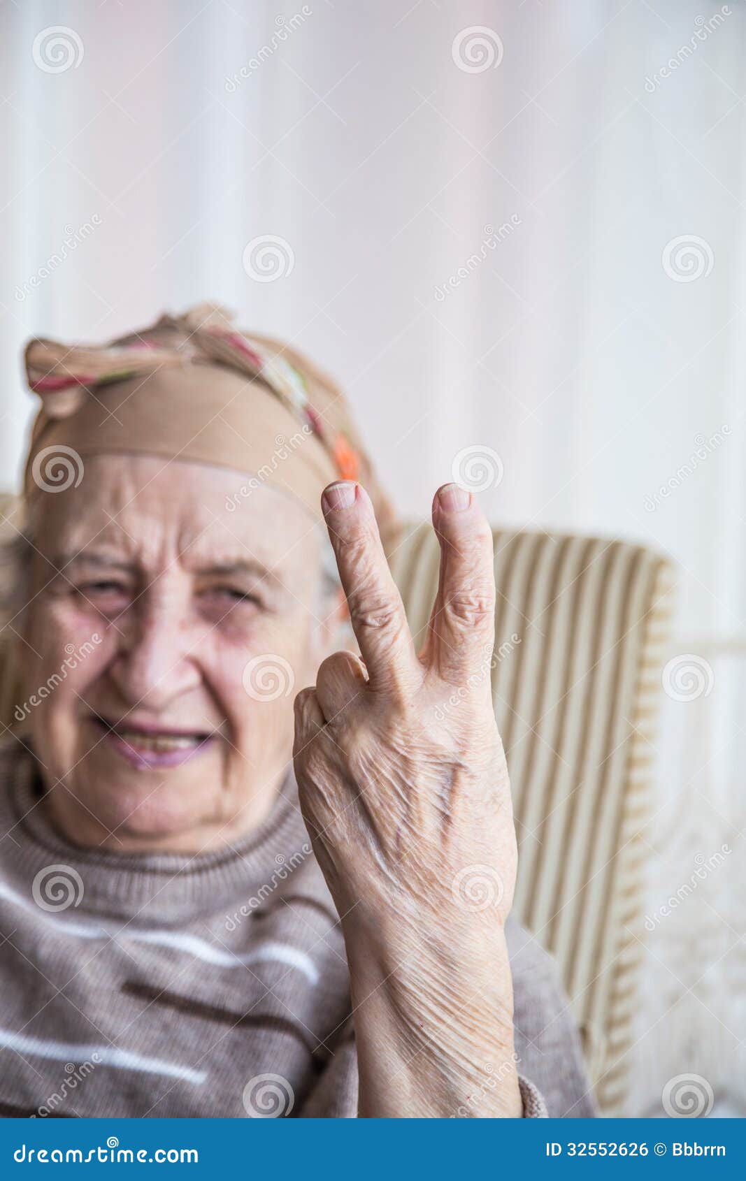 Making victory (V) sign stock photo. Image of face, people - 32552626