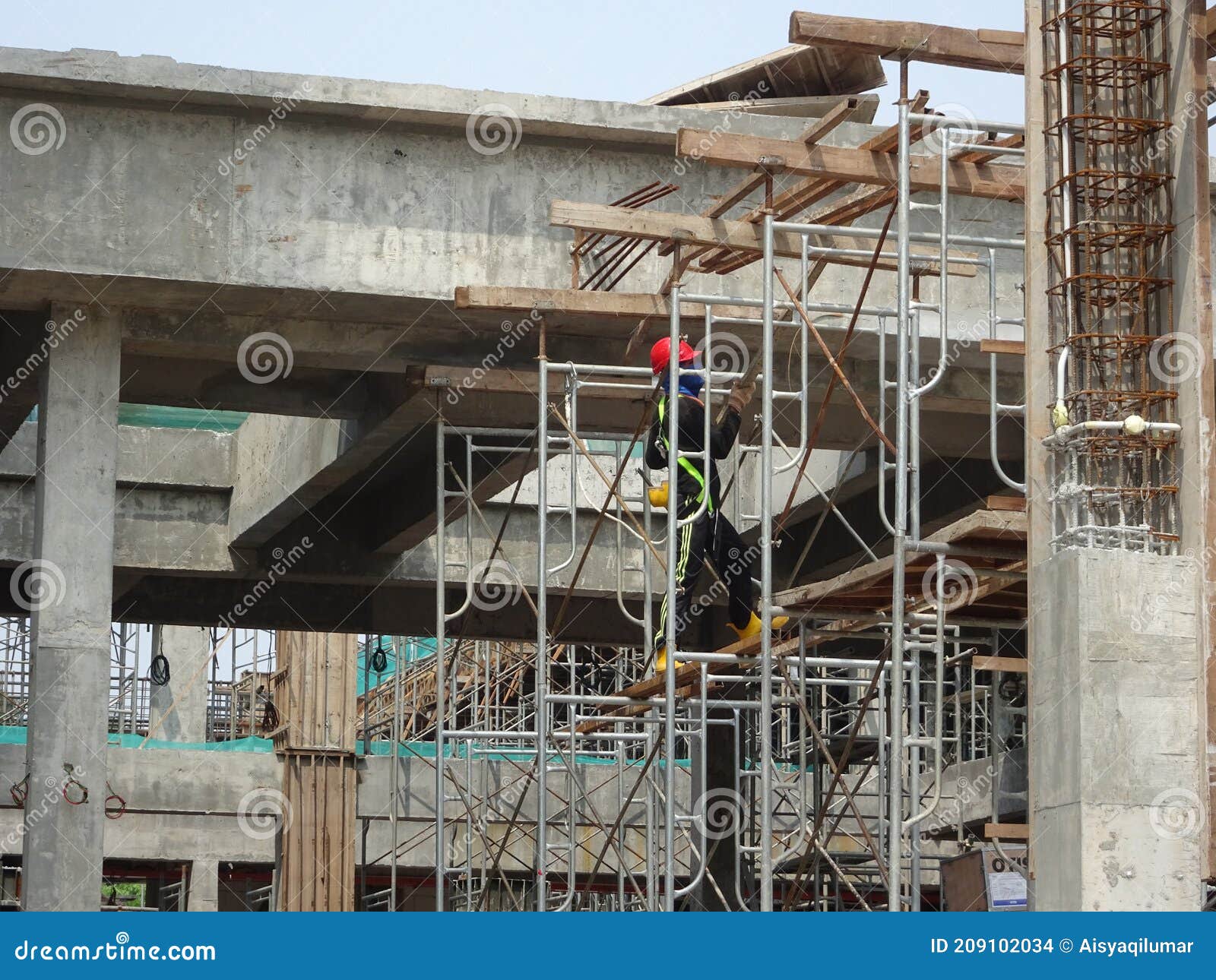 Construction Workers Working at Height at the Construction Site ...