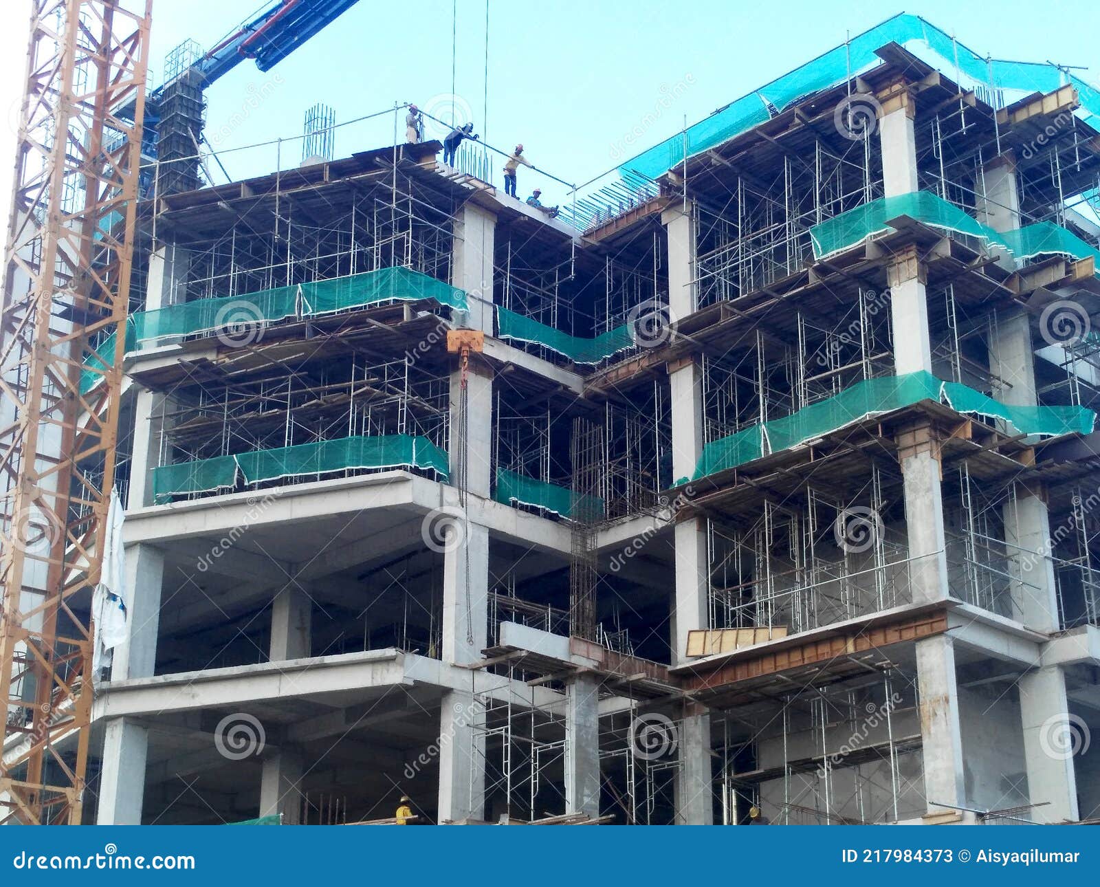 Construction Workers Working At Height At The Construction Site ...