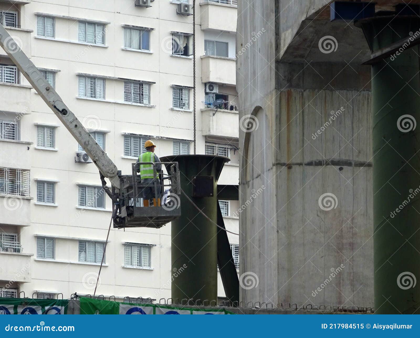 Construction Workers Working at Height at the Construction Site ...