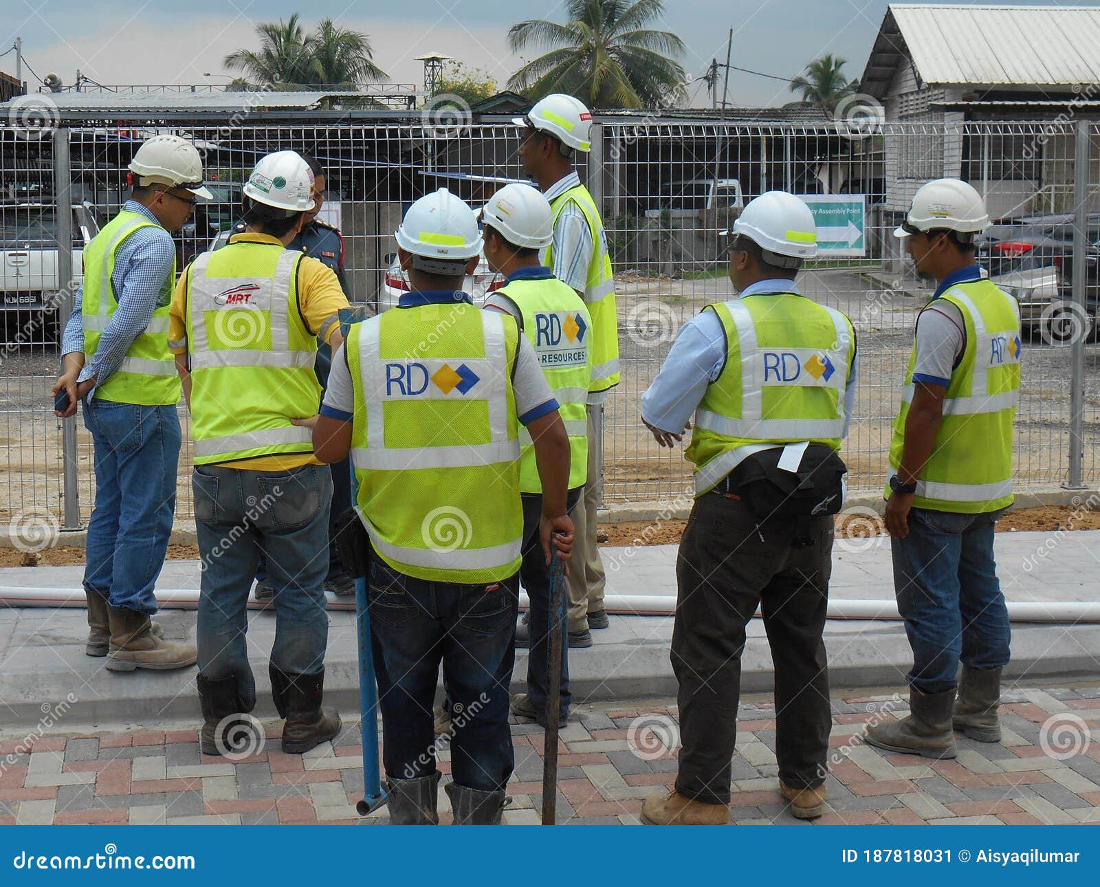 Construction Workers Having a Discussion at the Construction Site ...