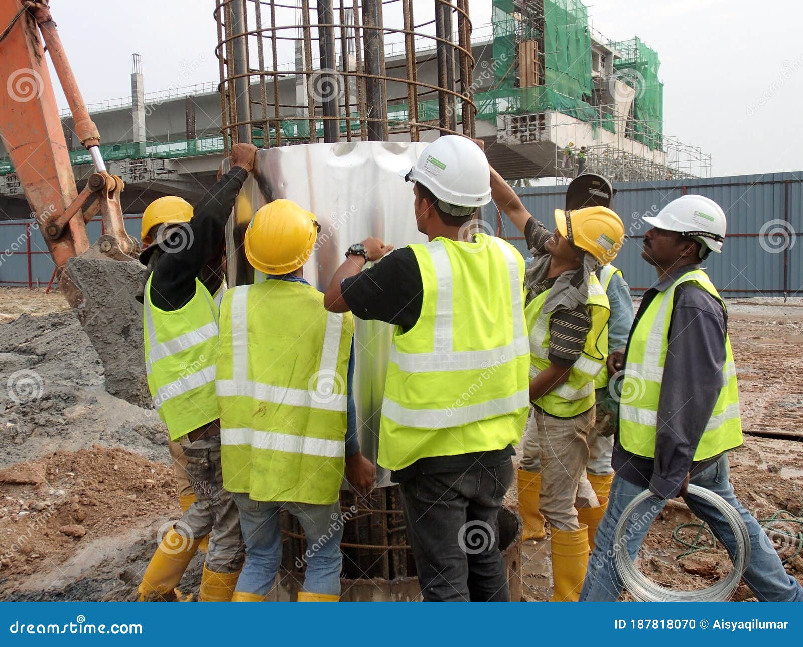 Construction Workers Having a Discussion at the Construction Site ...