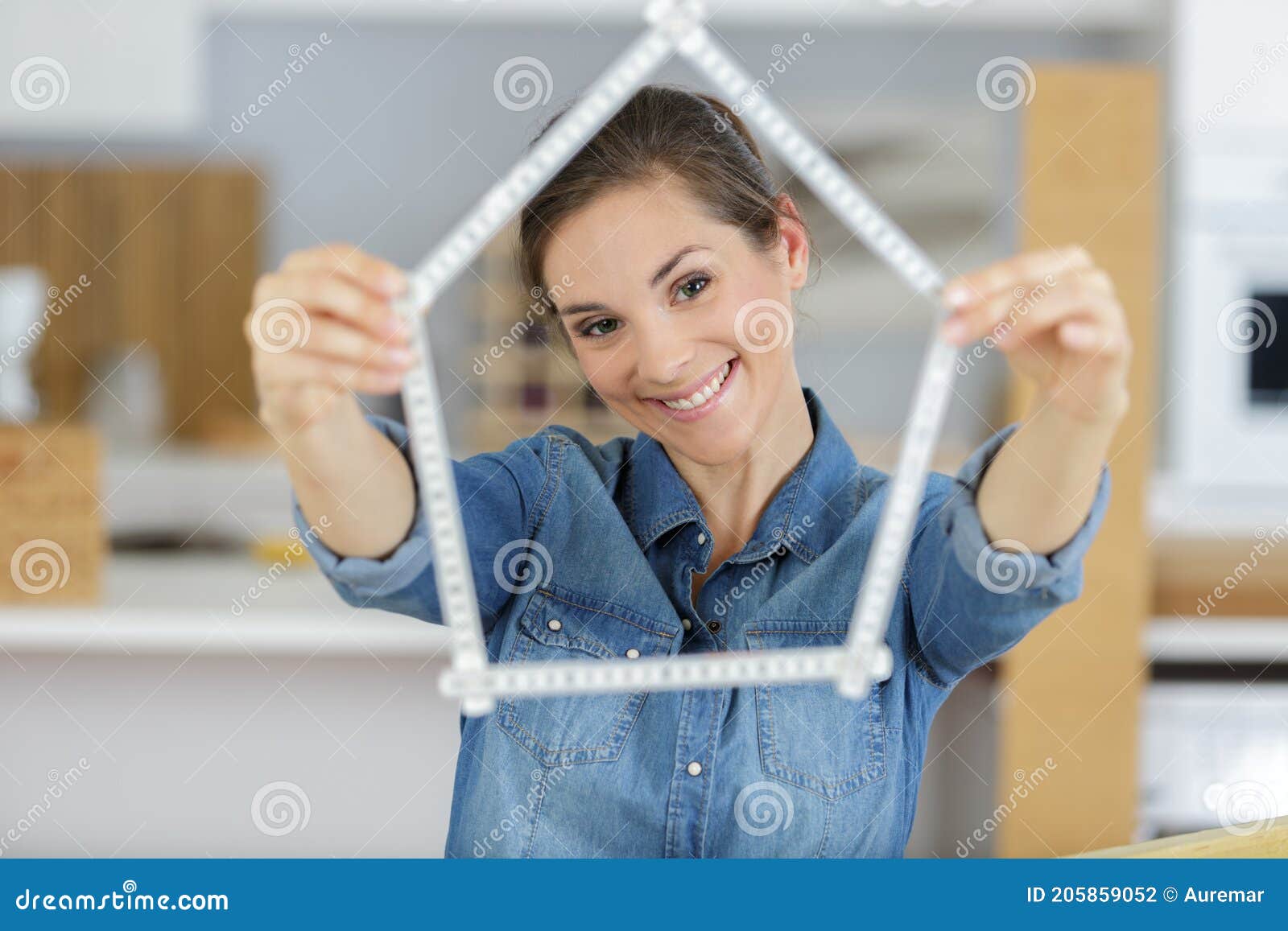 Malay Woman Holding Folderable Ruler Form House Shape Stock Photo ...
