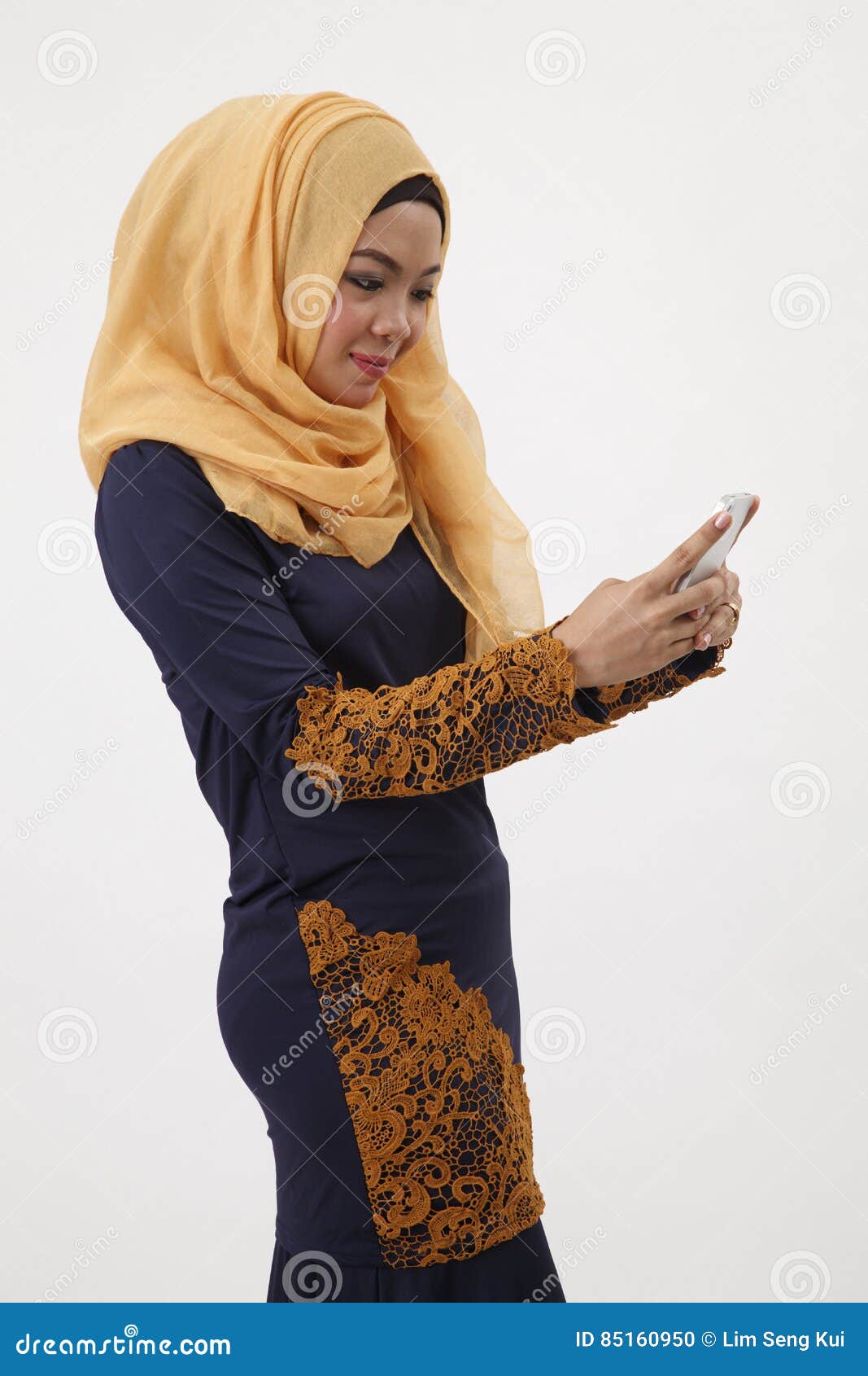 Malay woman sending sms stock photo. Image of girl, head - 85160950