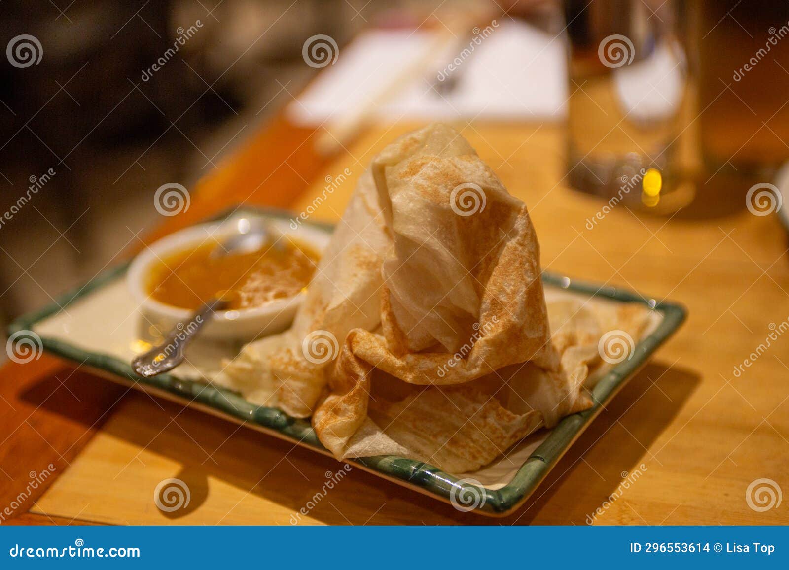 Malaysian dish Roti Canai stock photo. Image of starter - 296553614