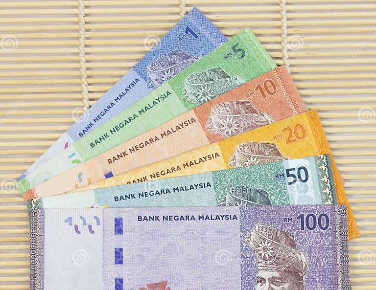 Malaysian Ringgit Currency Notes Fan Display on a Wooden Background ...
