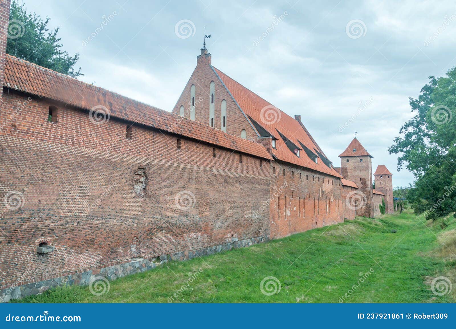Moat with Defence Wall of Malbork Castle, Poland Editorial Photo ...