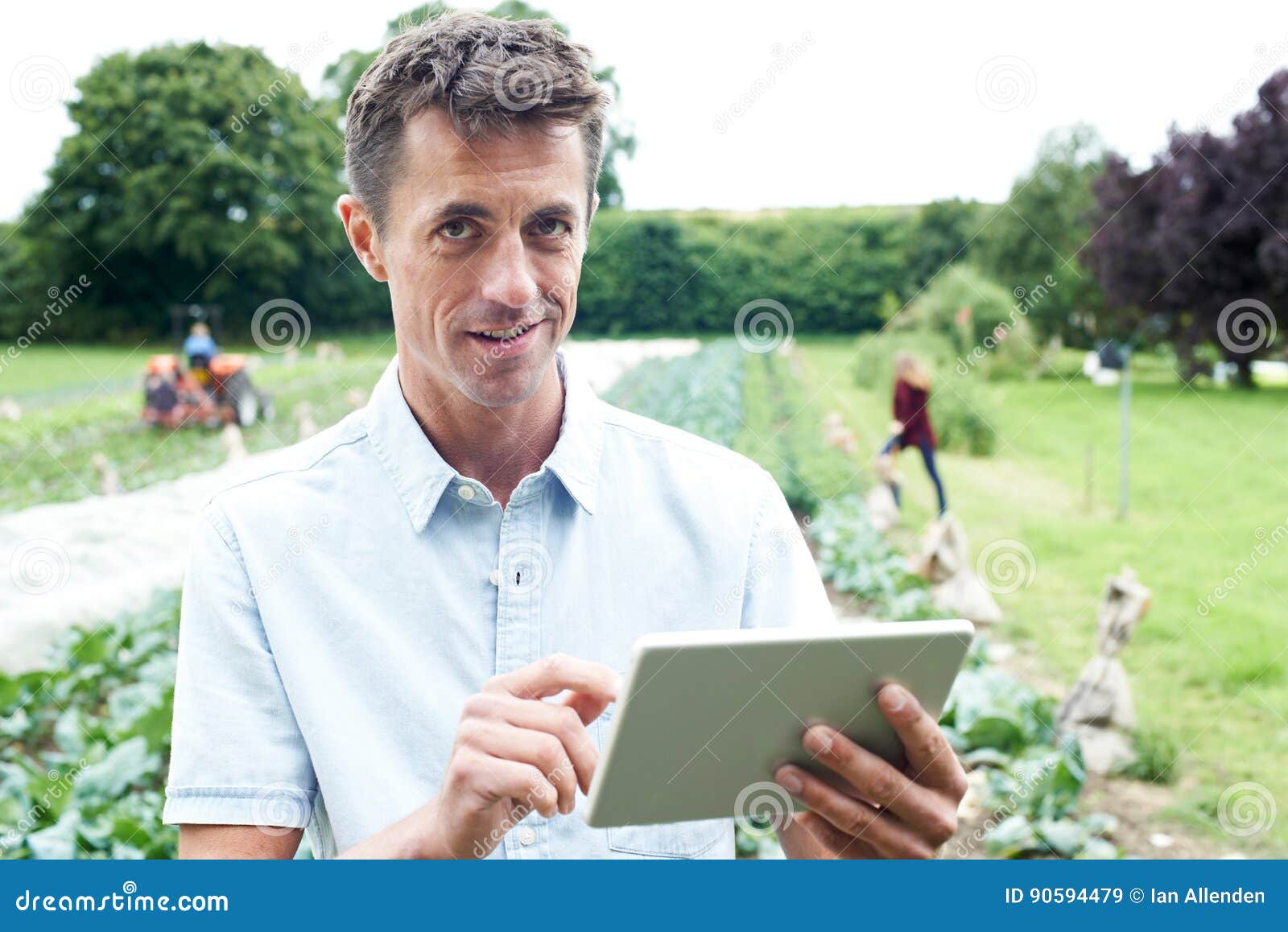 Male Agricultural Worker Using Digital Tablet in Field Stock Image ...